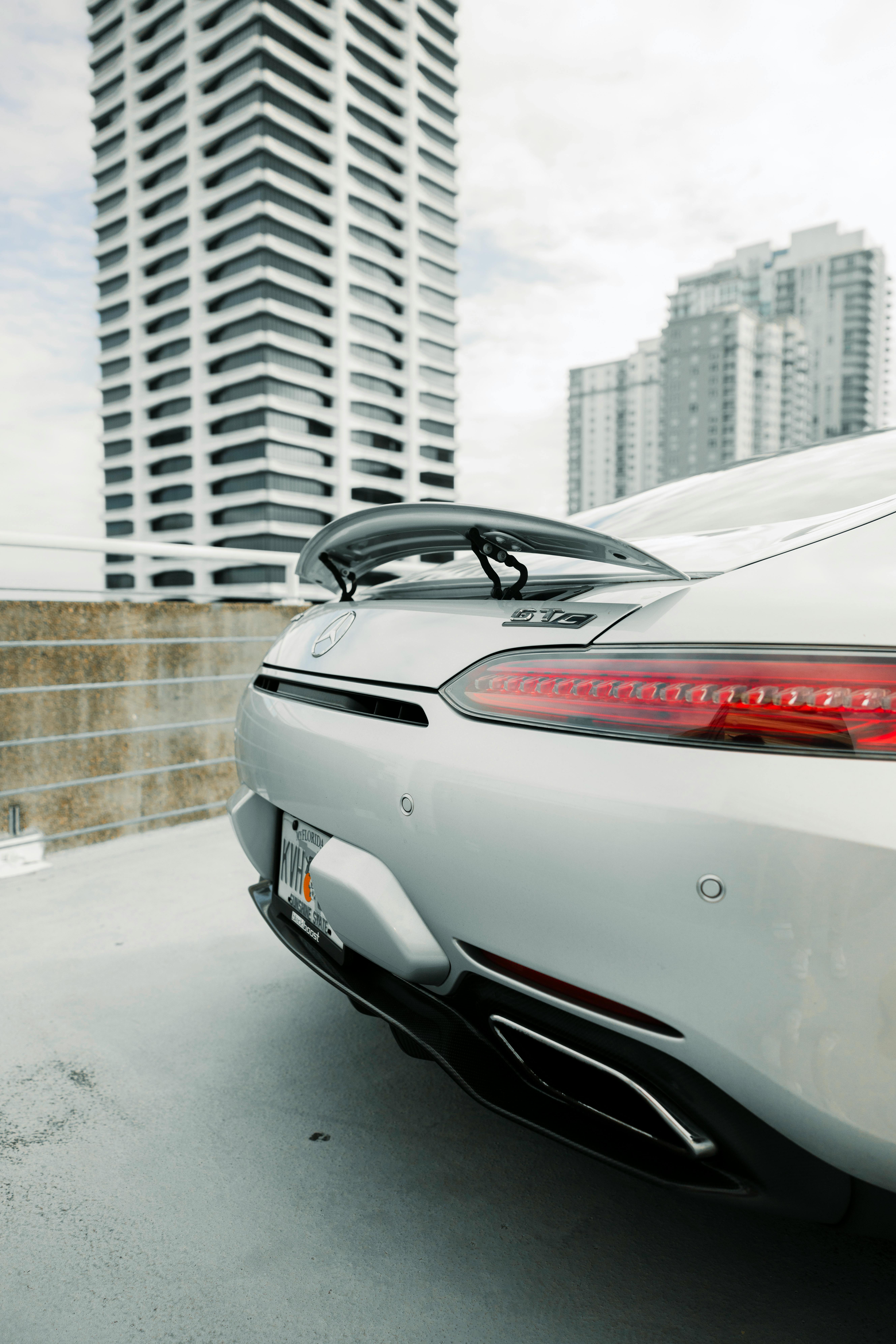 Sporty Silver Car with Urban Background · Free Stock Photo