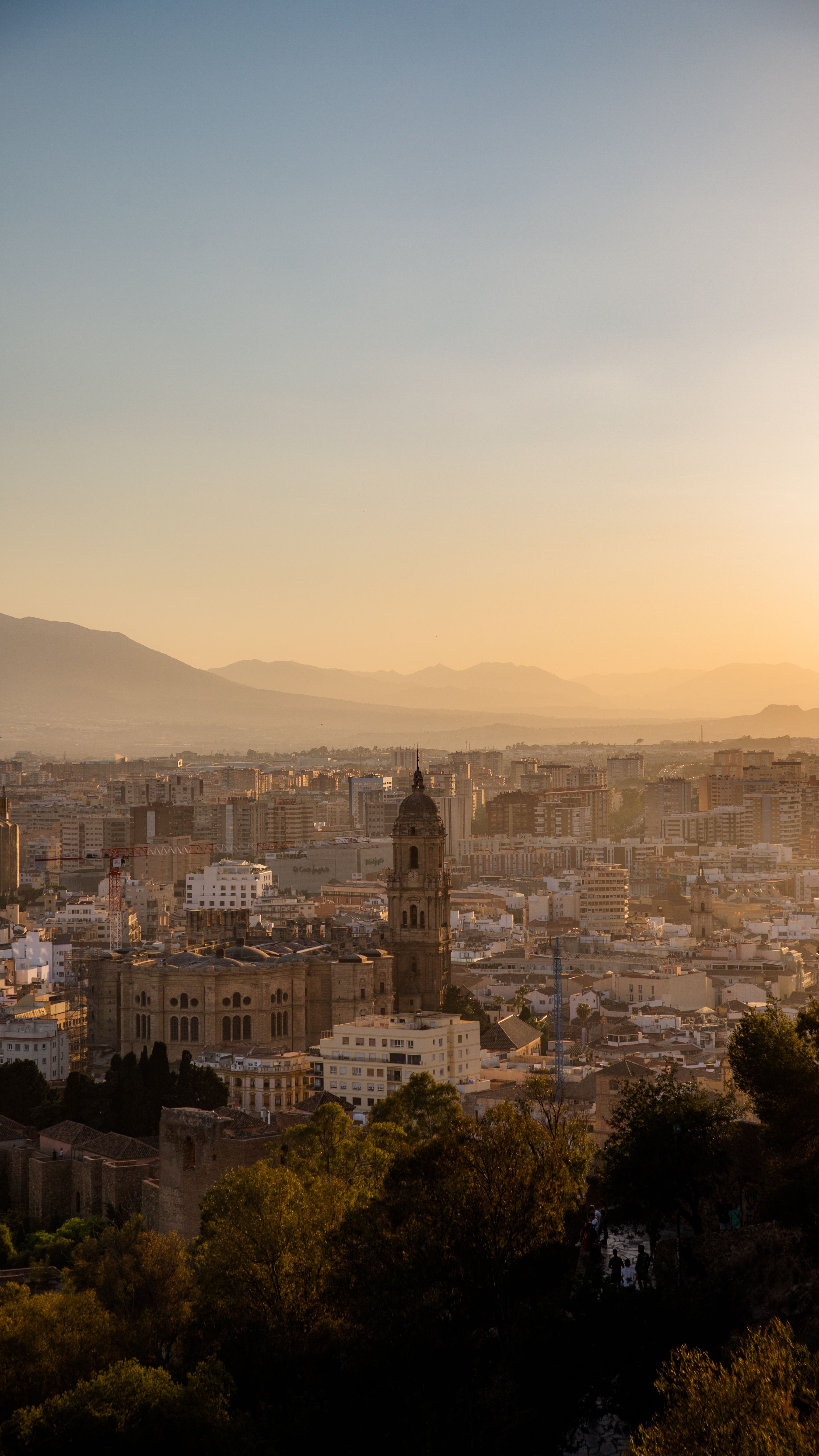Scenic Malaga Cityscape at Sunset · Free Stock Photo