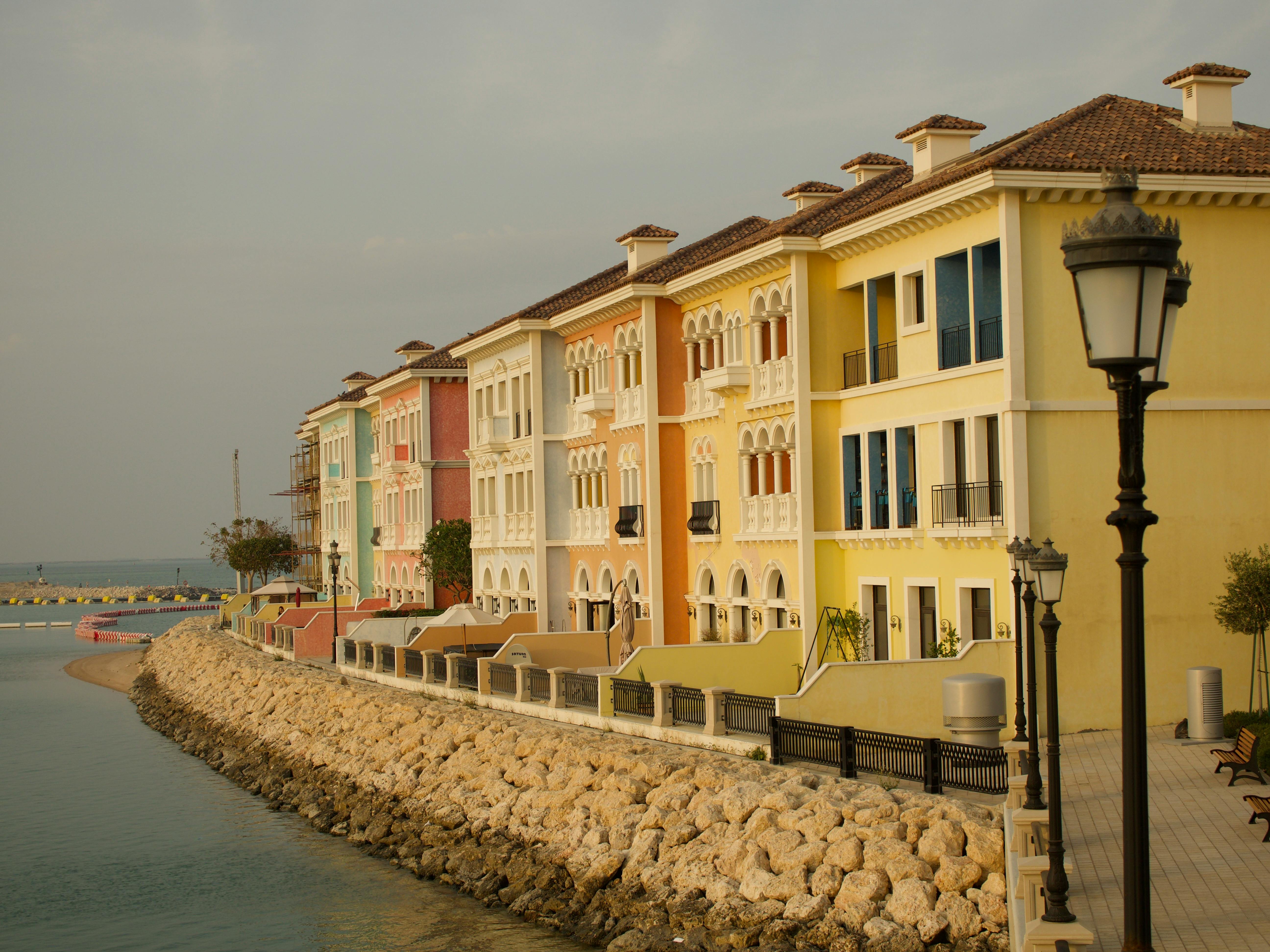Colorful Waterfront Architecture in Doha · Free Stock Photo