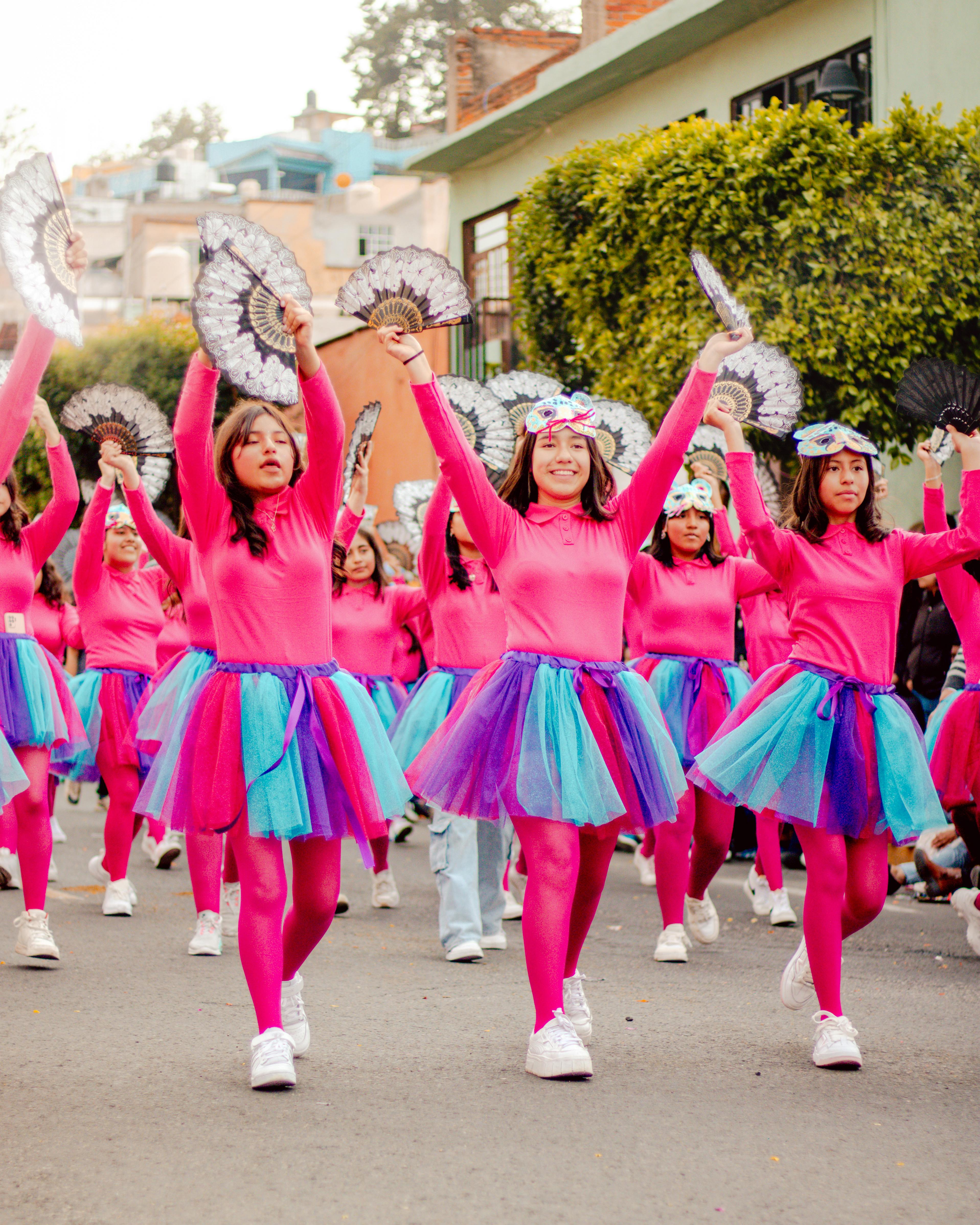 Colorful Parade with Festive Dancers in Costume · Free Stock Photo