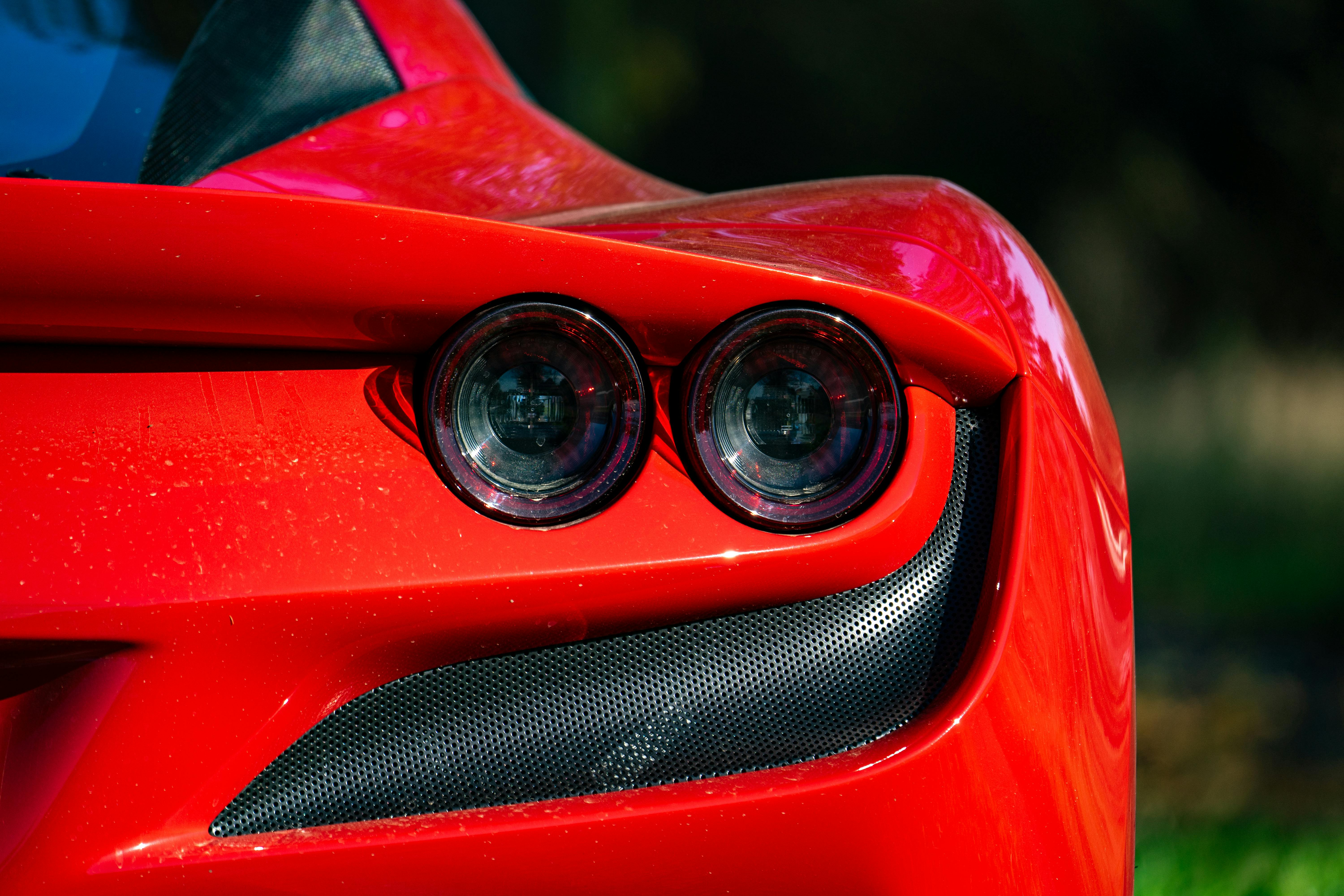 Close-up of Red Sports Car Tail Light · Free Stock Photo
