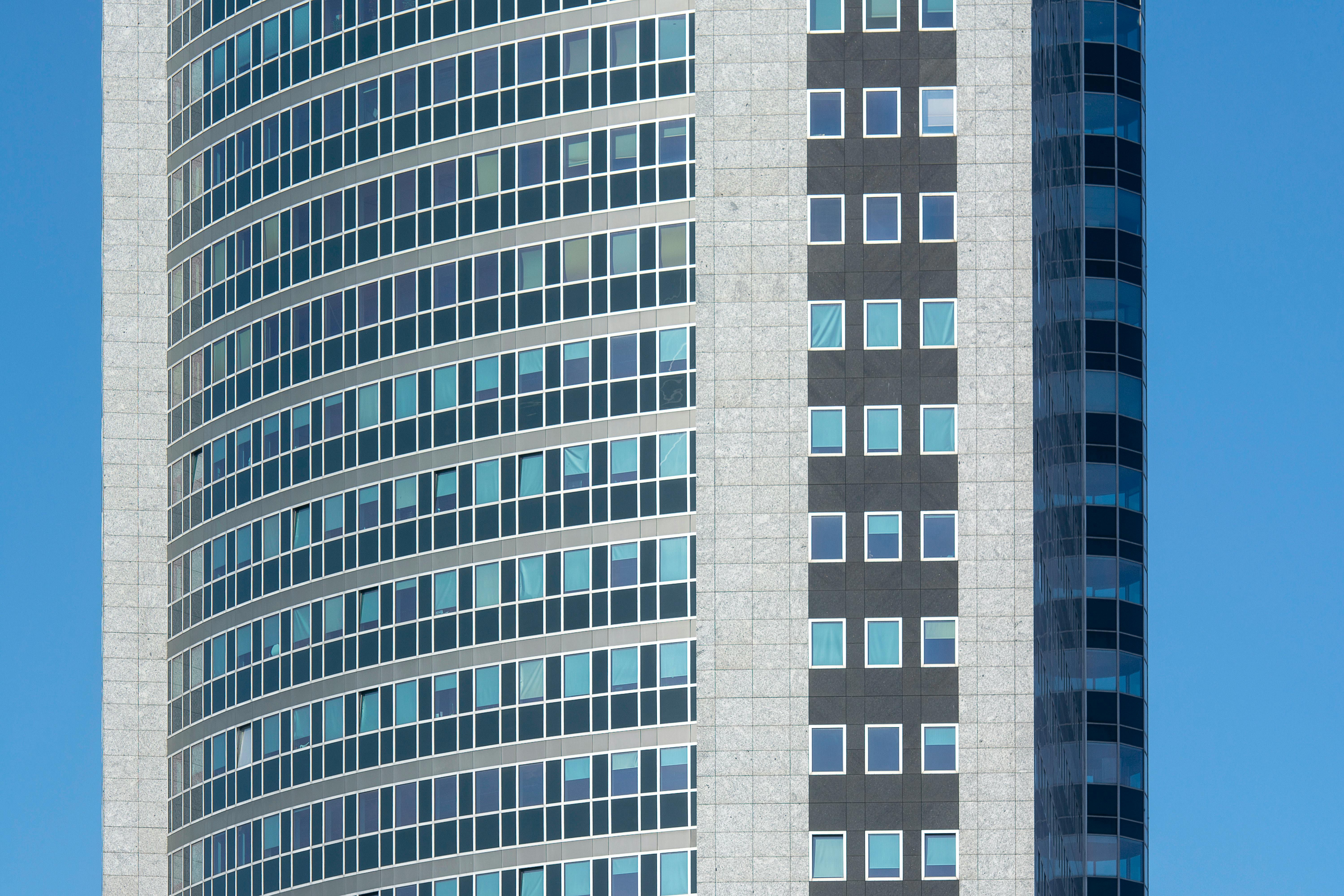 Modern High-Rise Building Facade in Amsterdam · Free Stock Photo