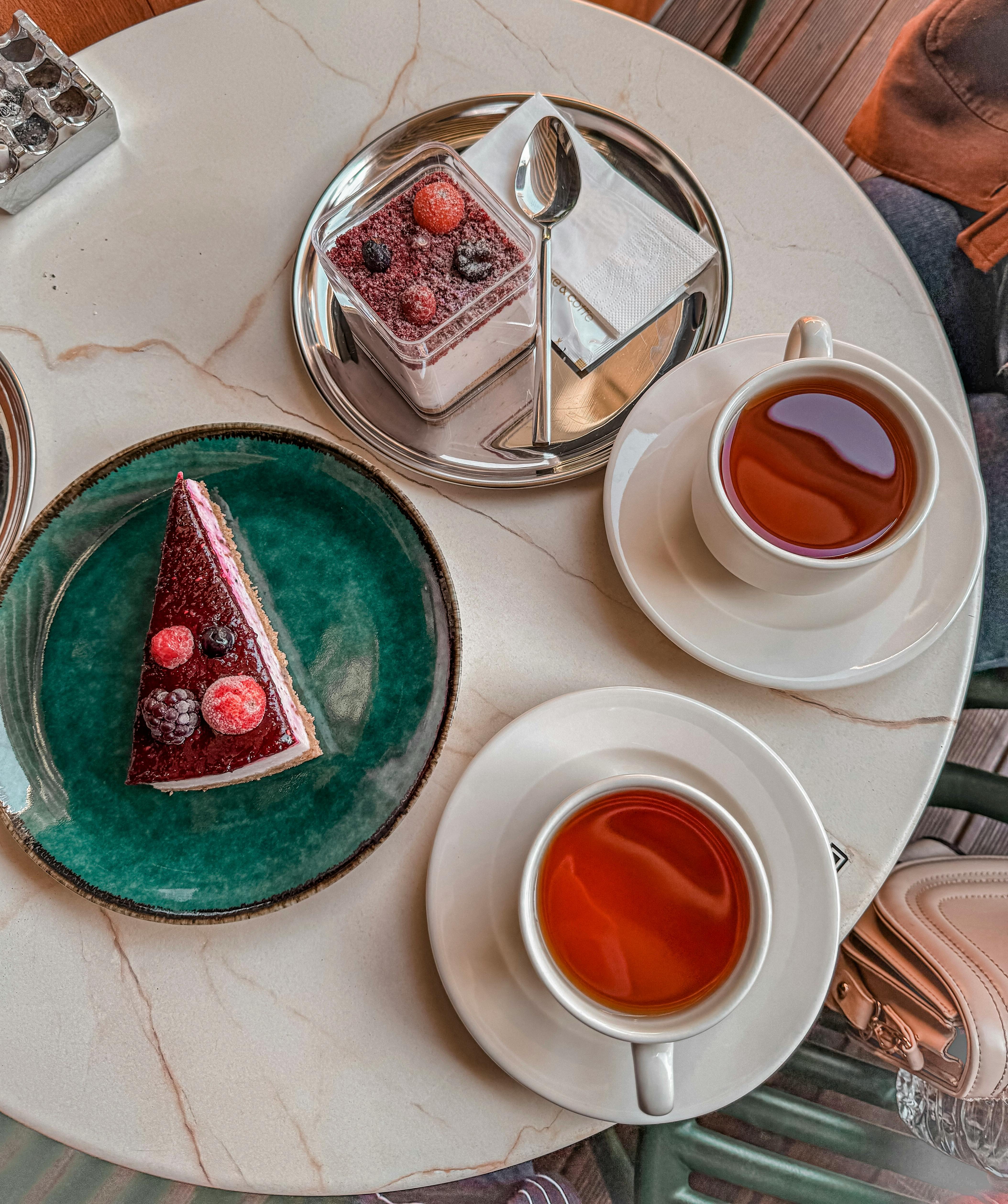 Elegant Tea Time with Pastries in Bursa Cafe · Free Stock Photo