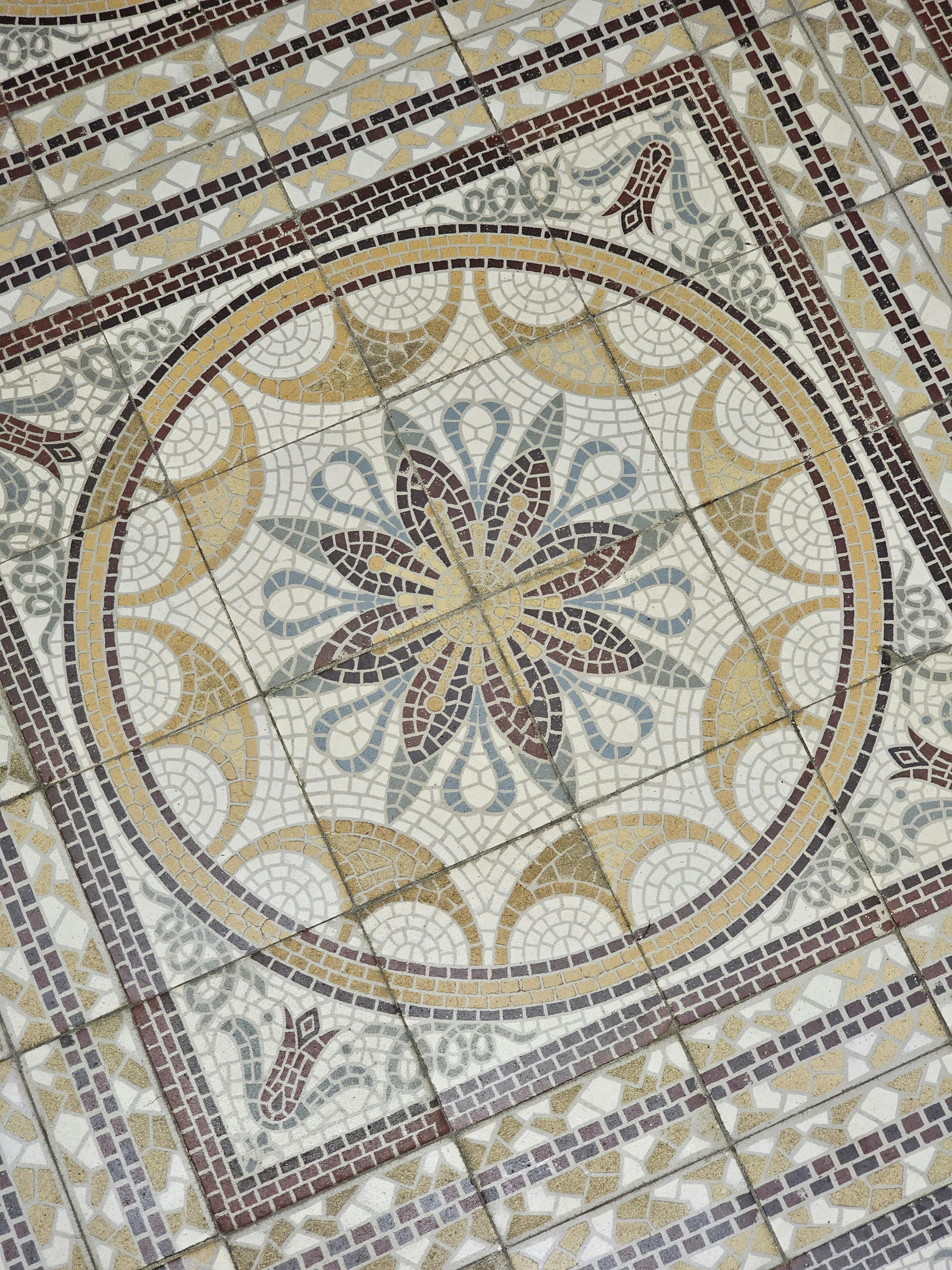 Intricate Geometric Mosaic Floor Pattern Design · Free Stock Photo