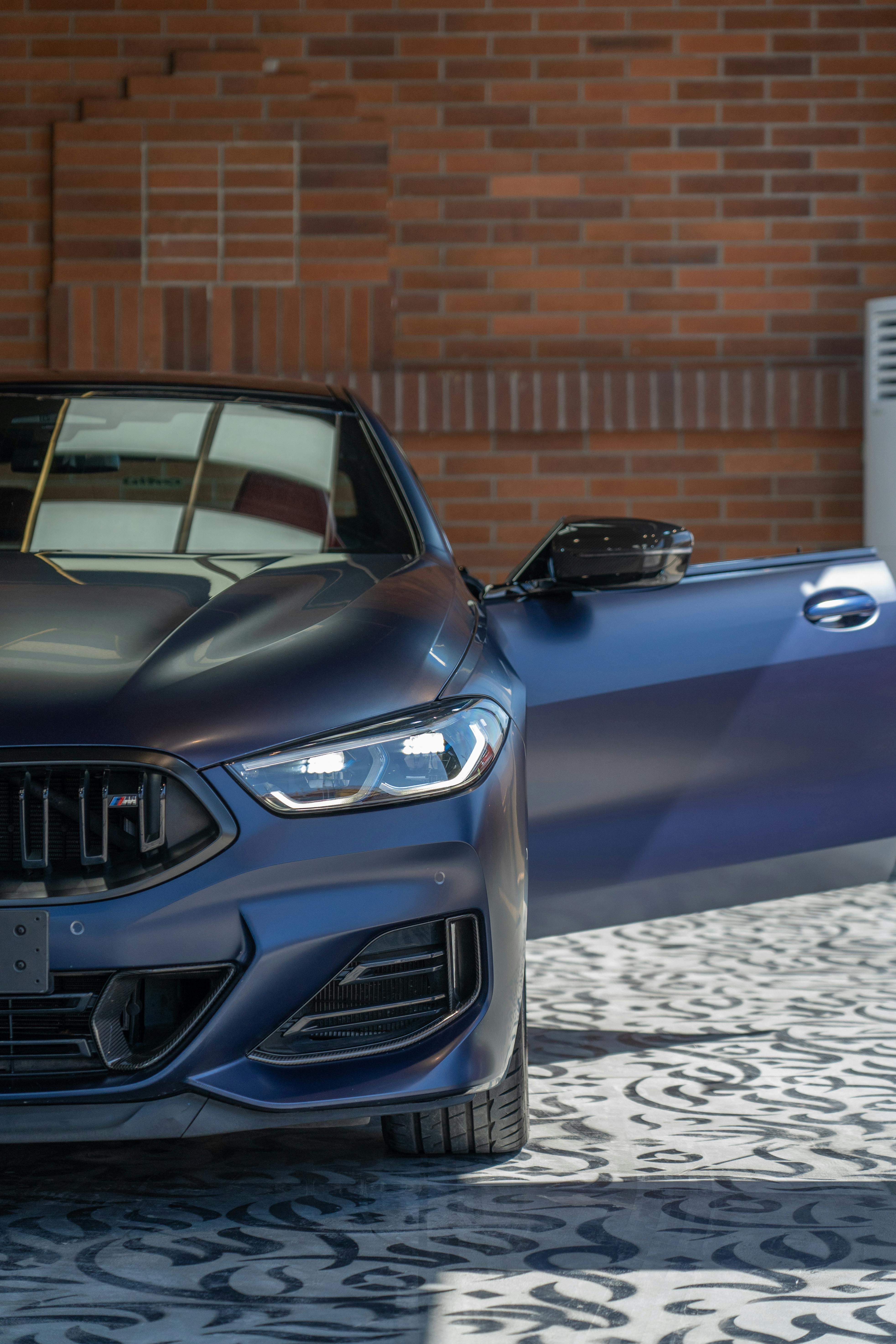 Sleek Blue Sports Car with Open Door in Erbil · Free Stock Photo