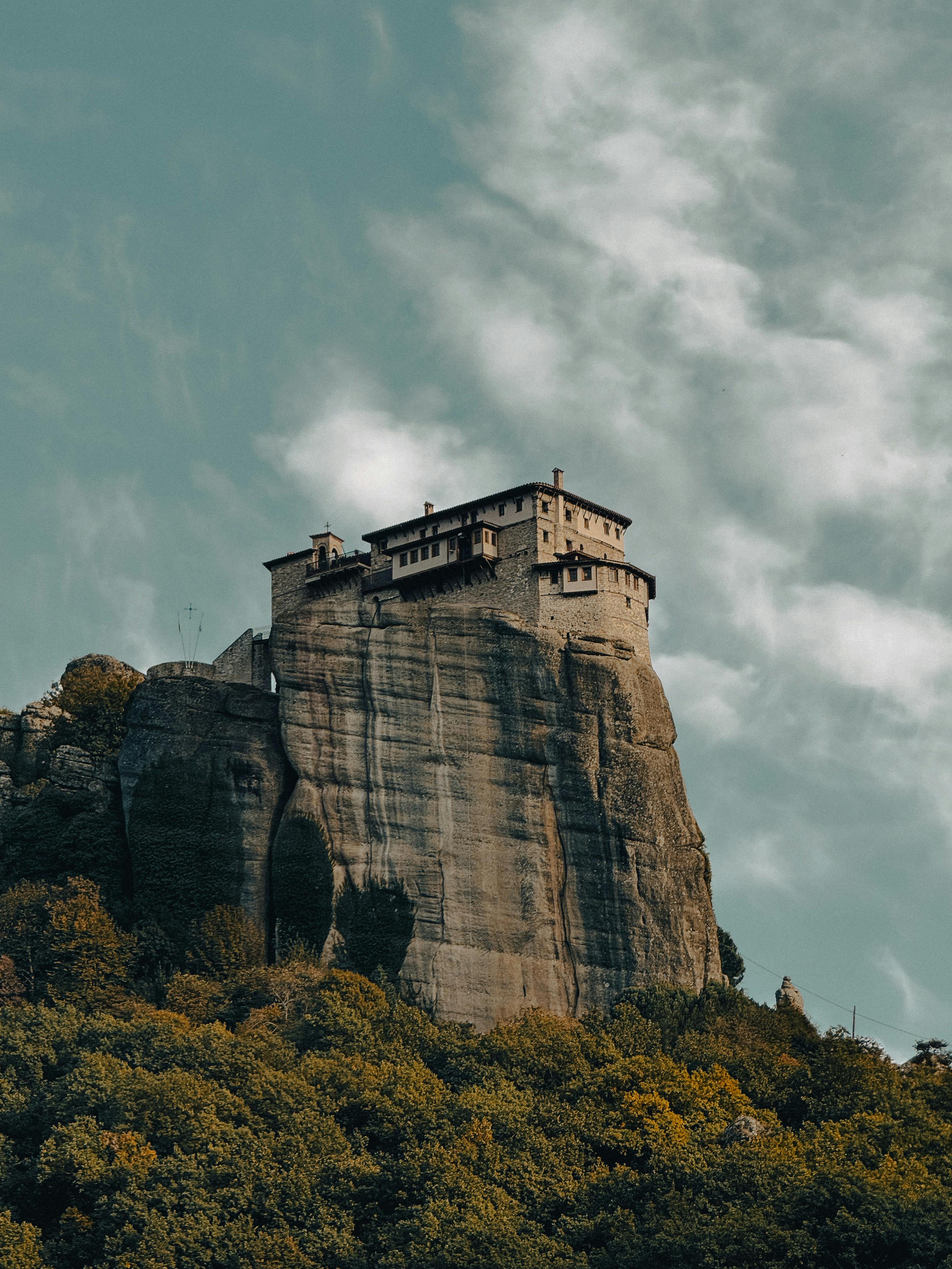Scenic View of Monastery atop Meteora Rock Formation · Free Stock Photo