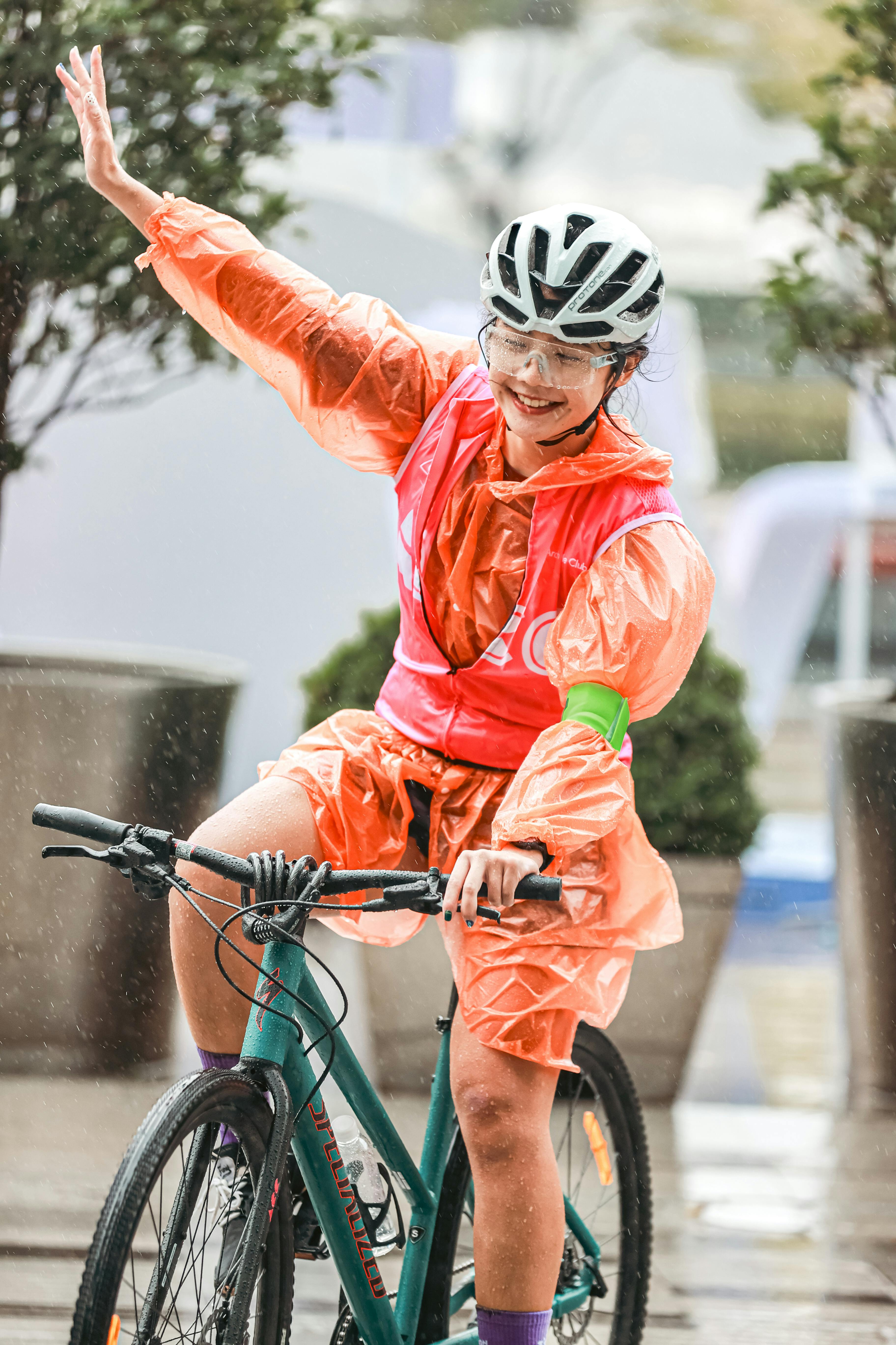 Person Riding a Bicycle during Rainy Day · Free Stock Photo