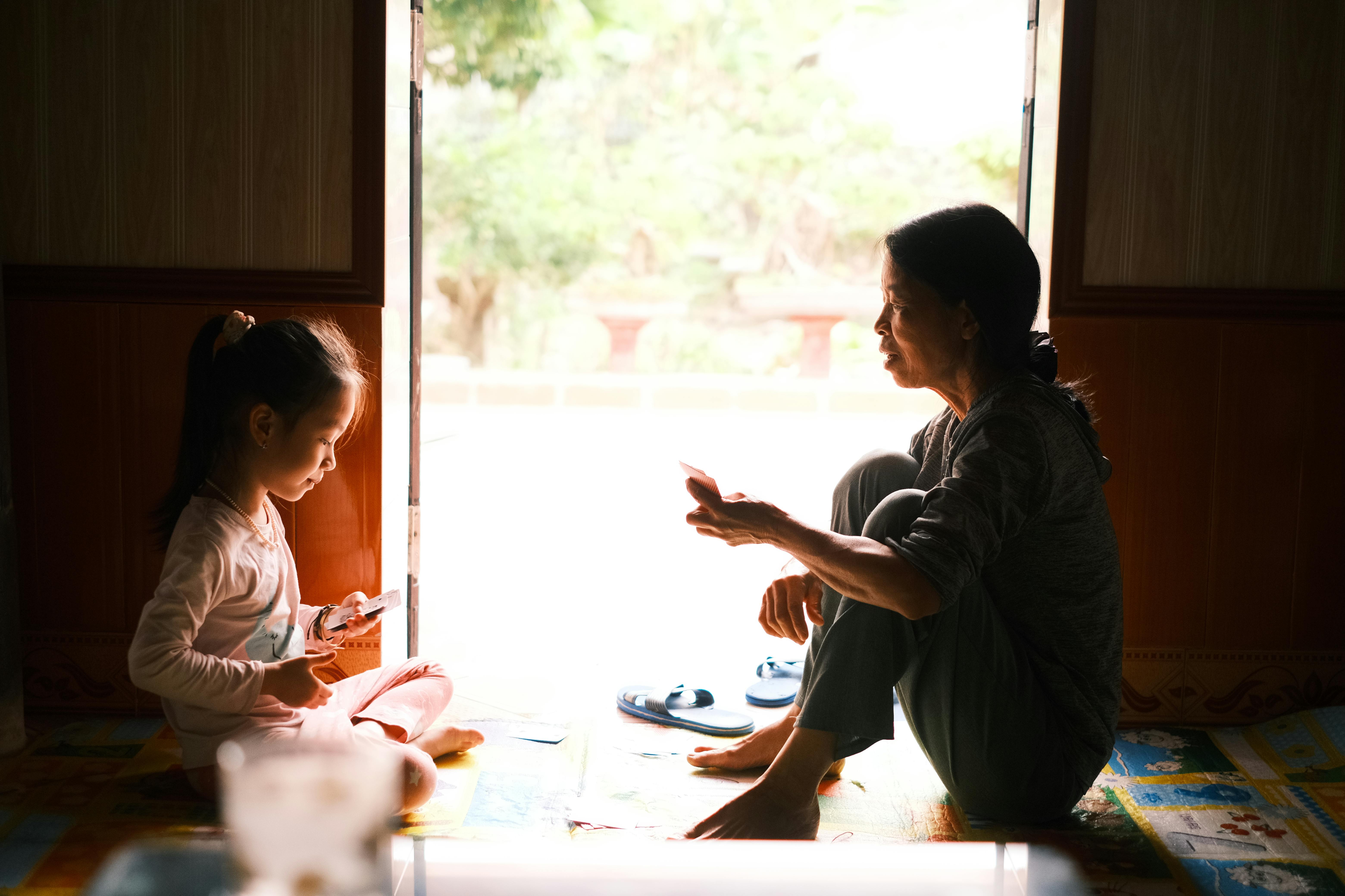 Intimate Family Interaction at Home · Free Stock Photo