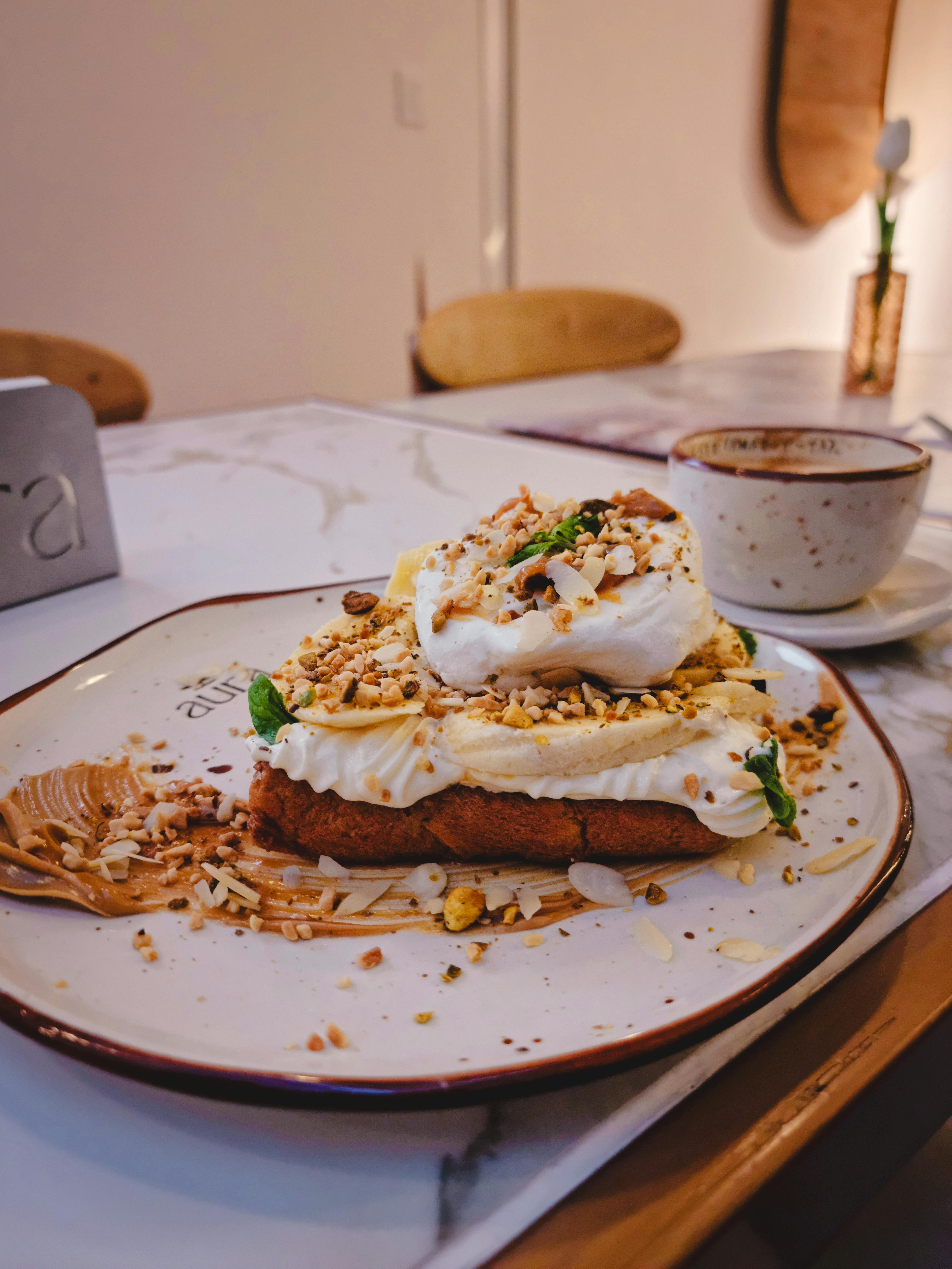 Toast Decorated with Pink Flowers on a Ceramic Plate · Free Stock Photo