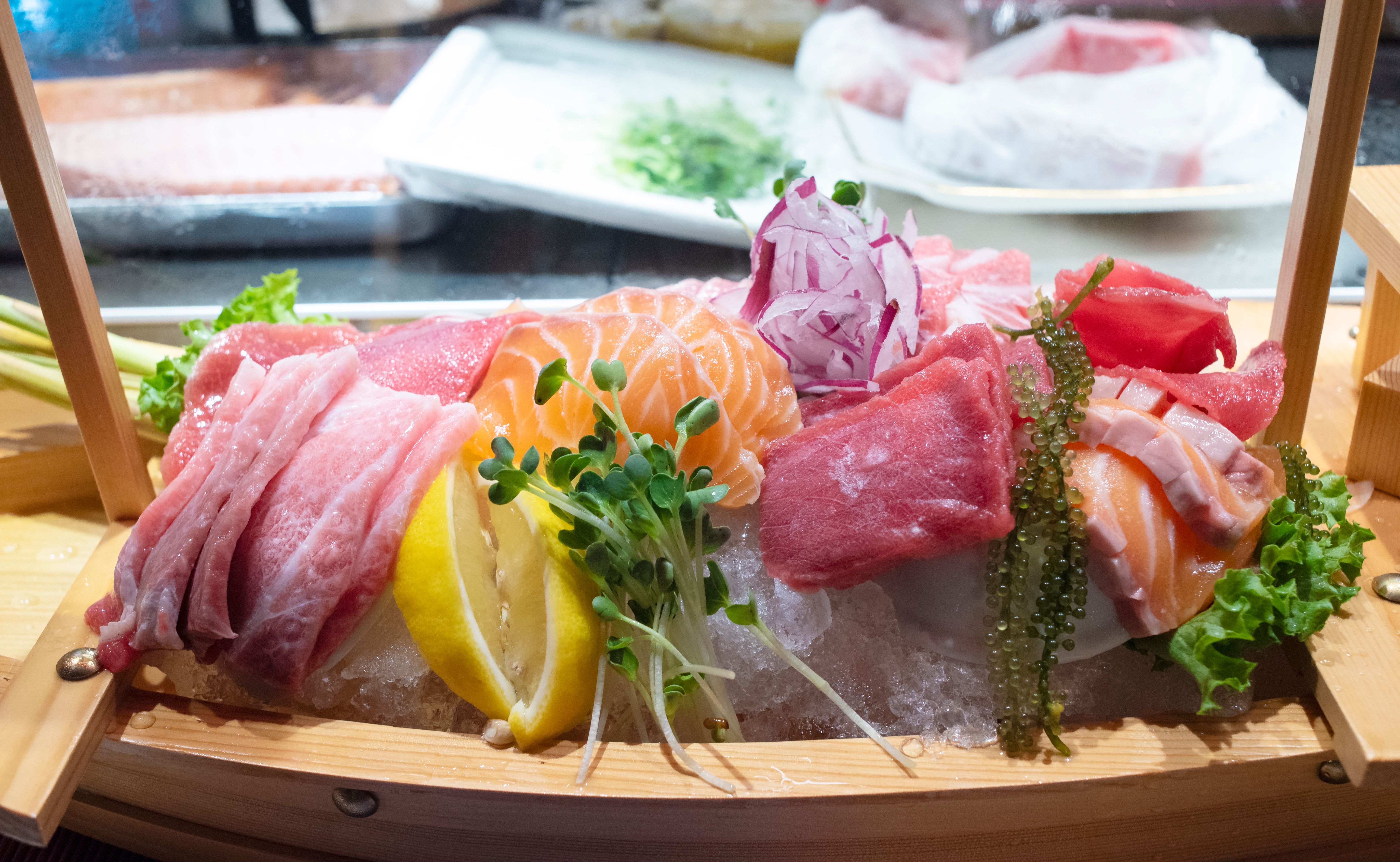 Exquisite Japanese Sashimi Set on Ice · Free Stock Photo