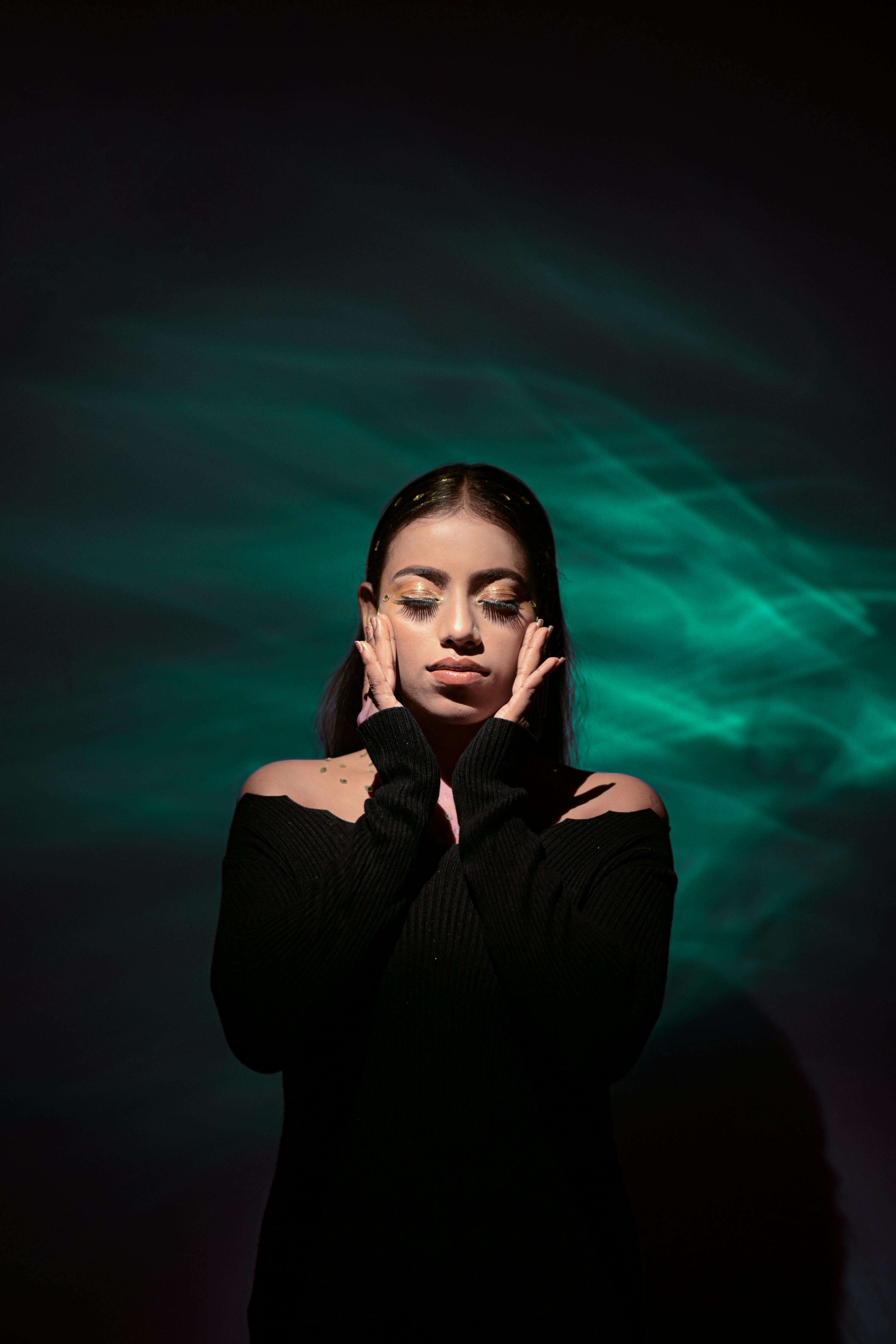 Creative Portrait of Woman with Dramatic Lighting · Free Stock Photo