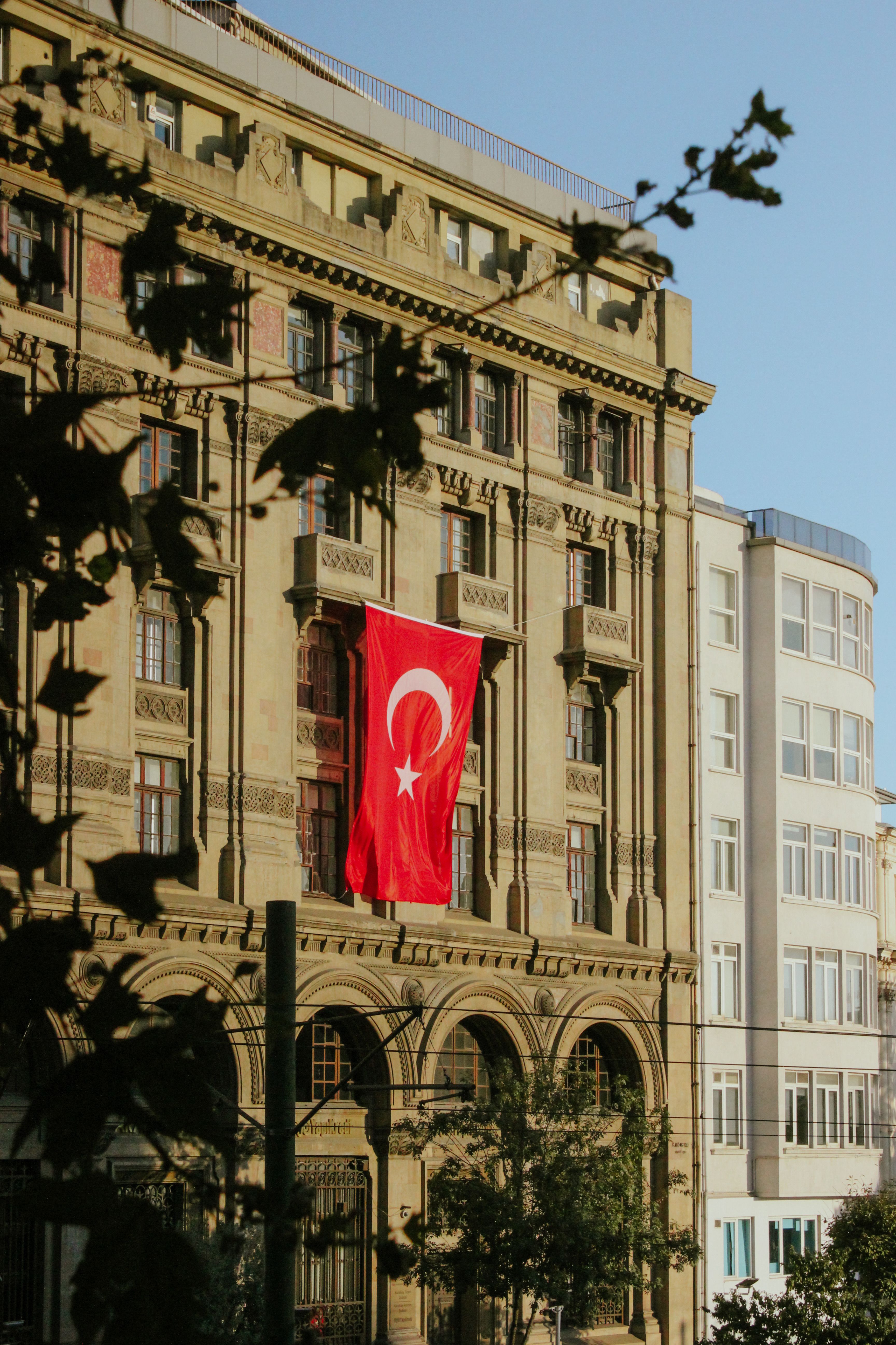 Historic Building with Turkish Flag in Istanbul · Free Stock Photo