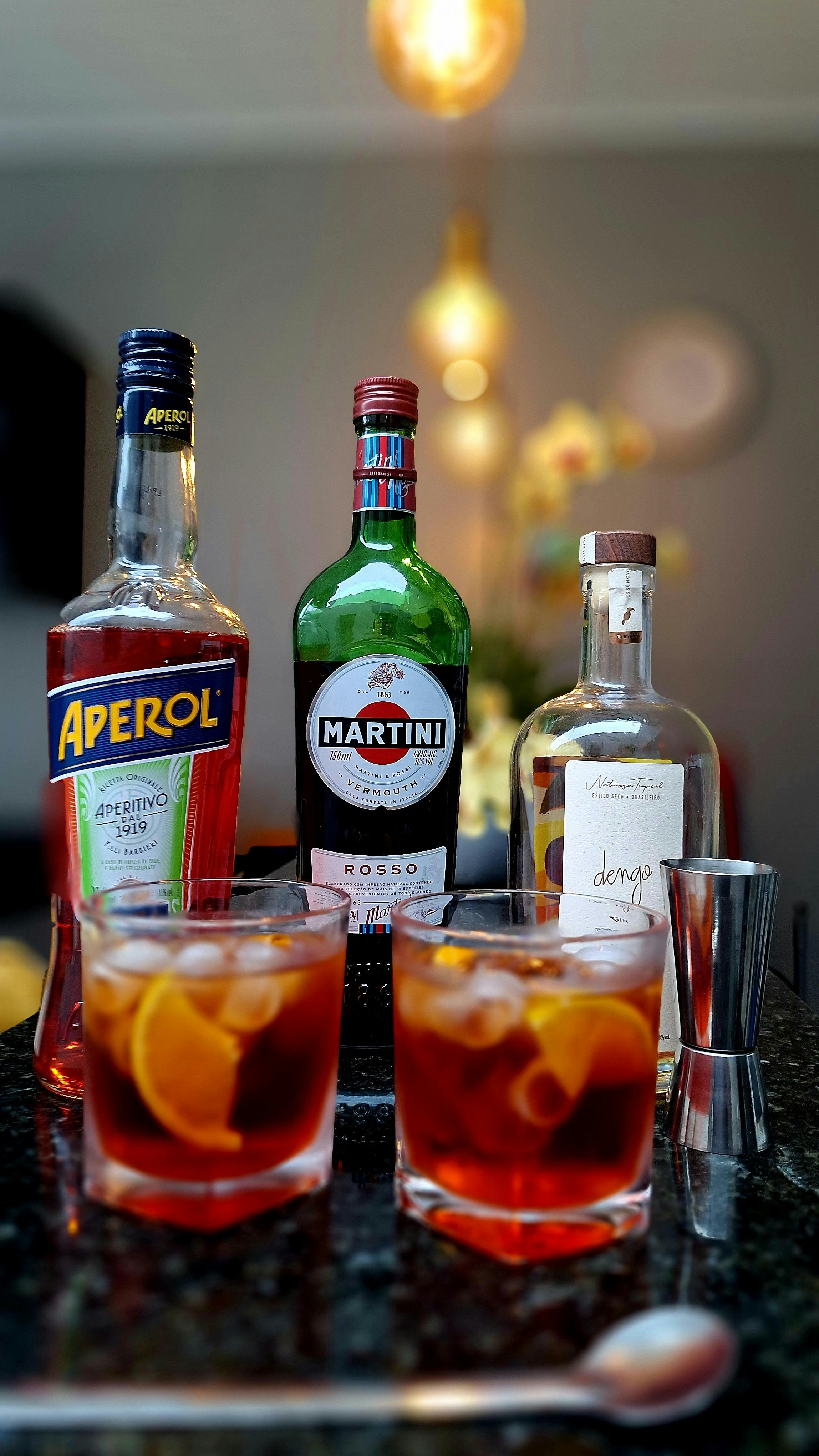 Vibrant Aperol and Martini Cocktail Setup · Free Stock Photo