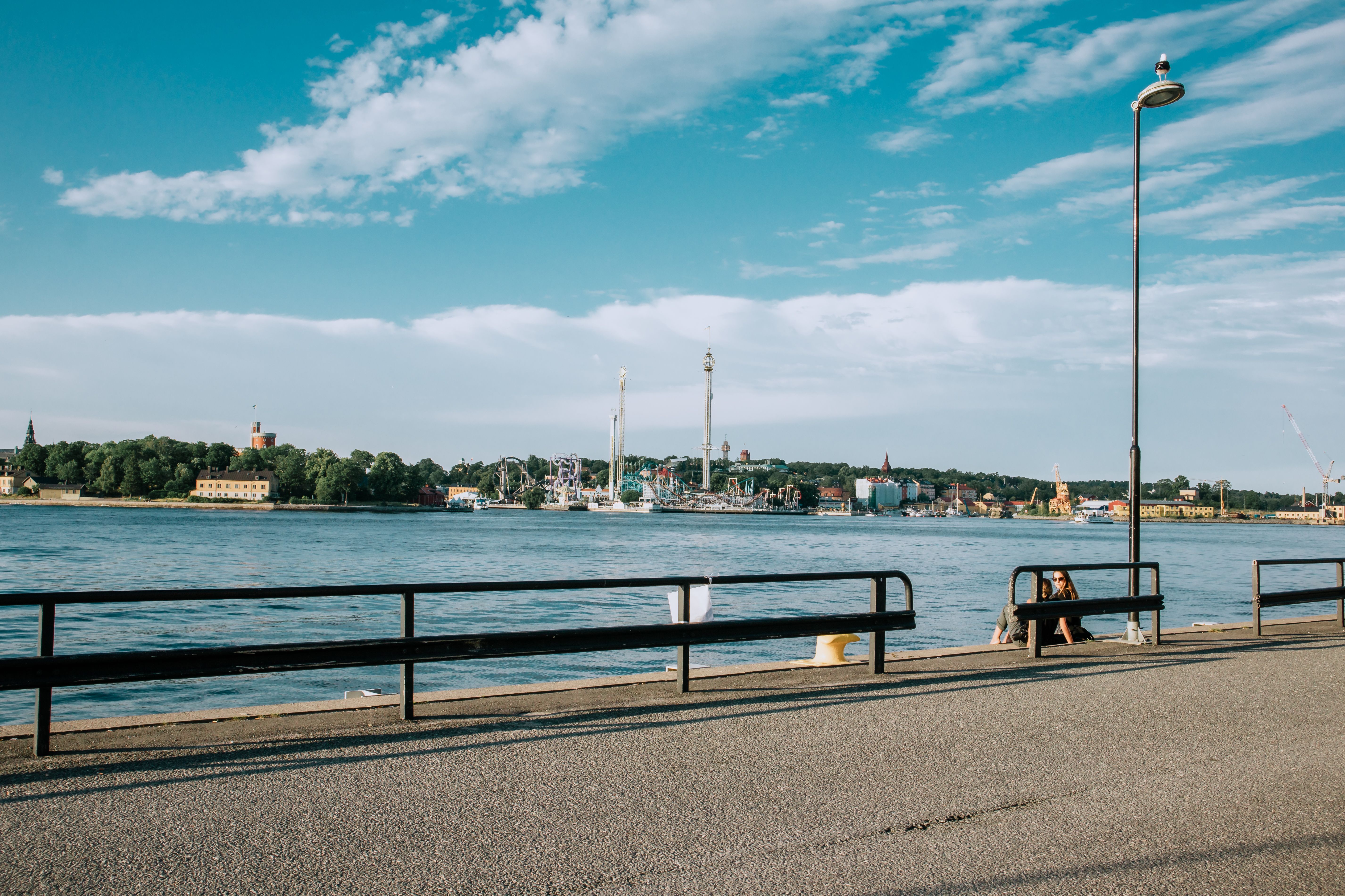 Scenic Waterfront View of Amusement Park · Free Stock Photo