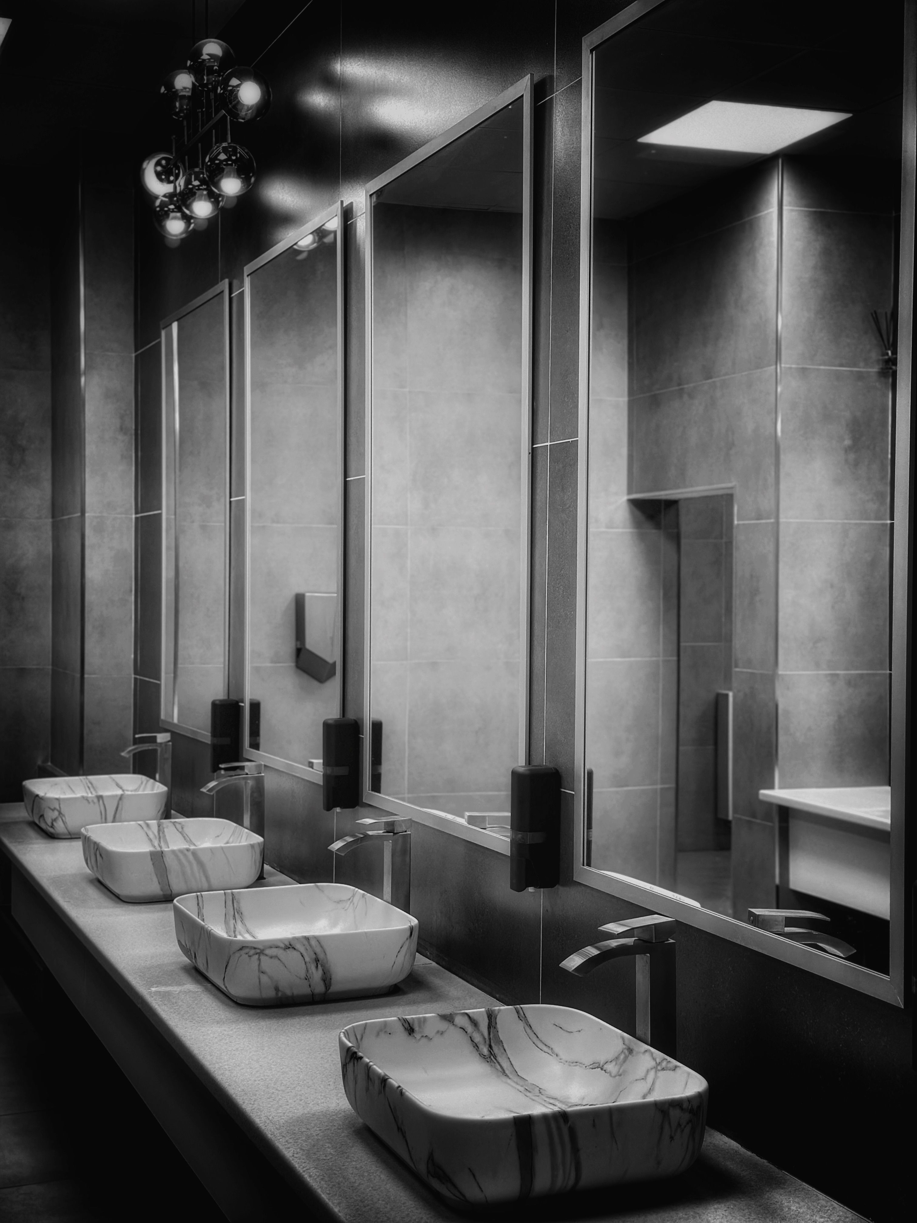 Modern Black and White Public Restroom Design · Free Stock Photo