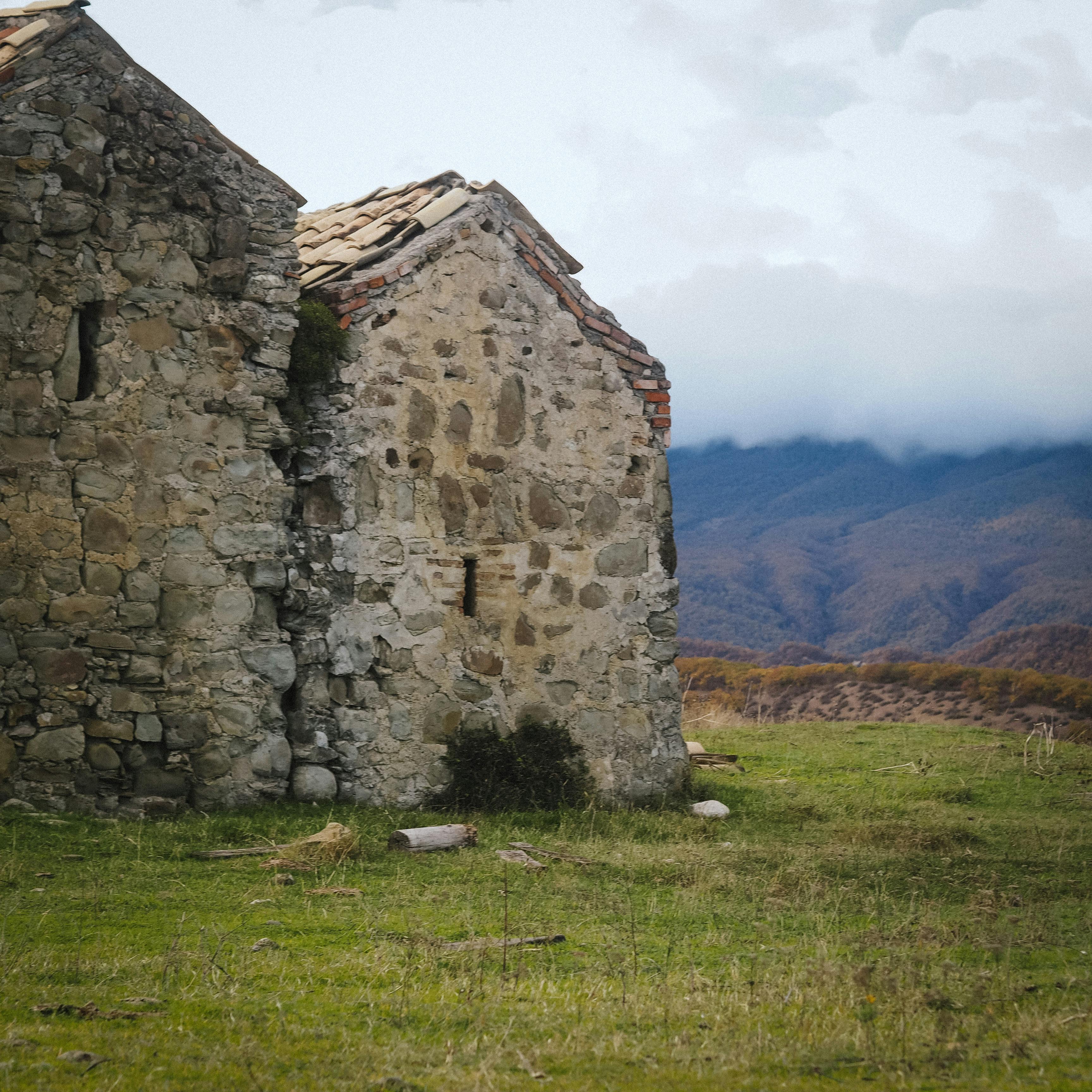 Rustic Stone Ruin in Scenic Mountain Landscape · Free Stock Photo
