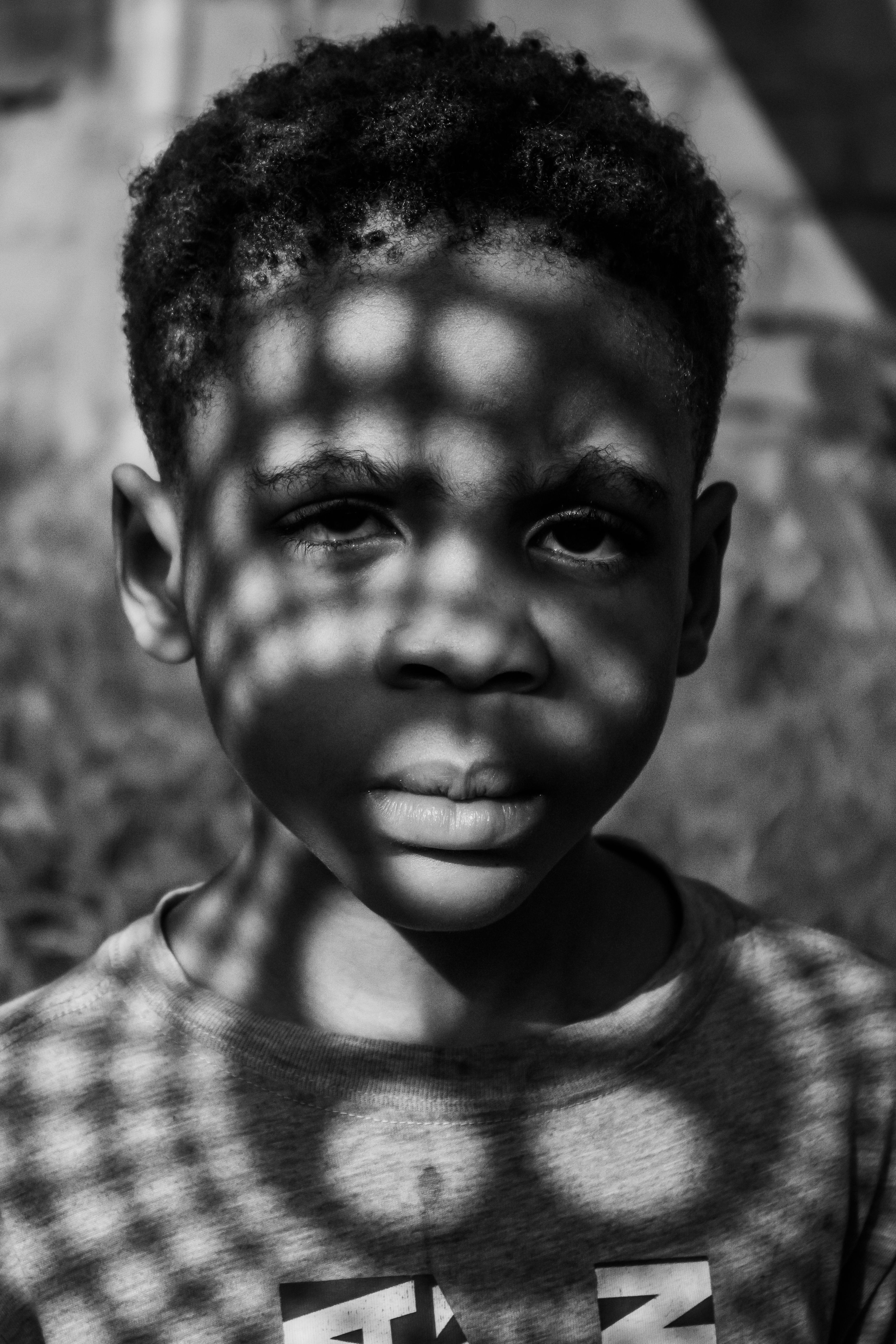 Portrait of Child in Artistic Shadow Play · Free Stock Photo