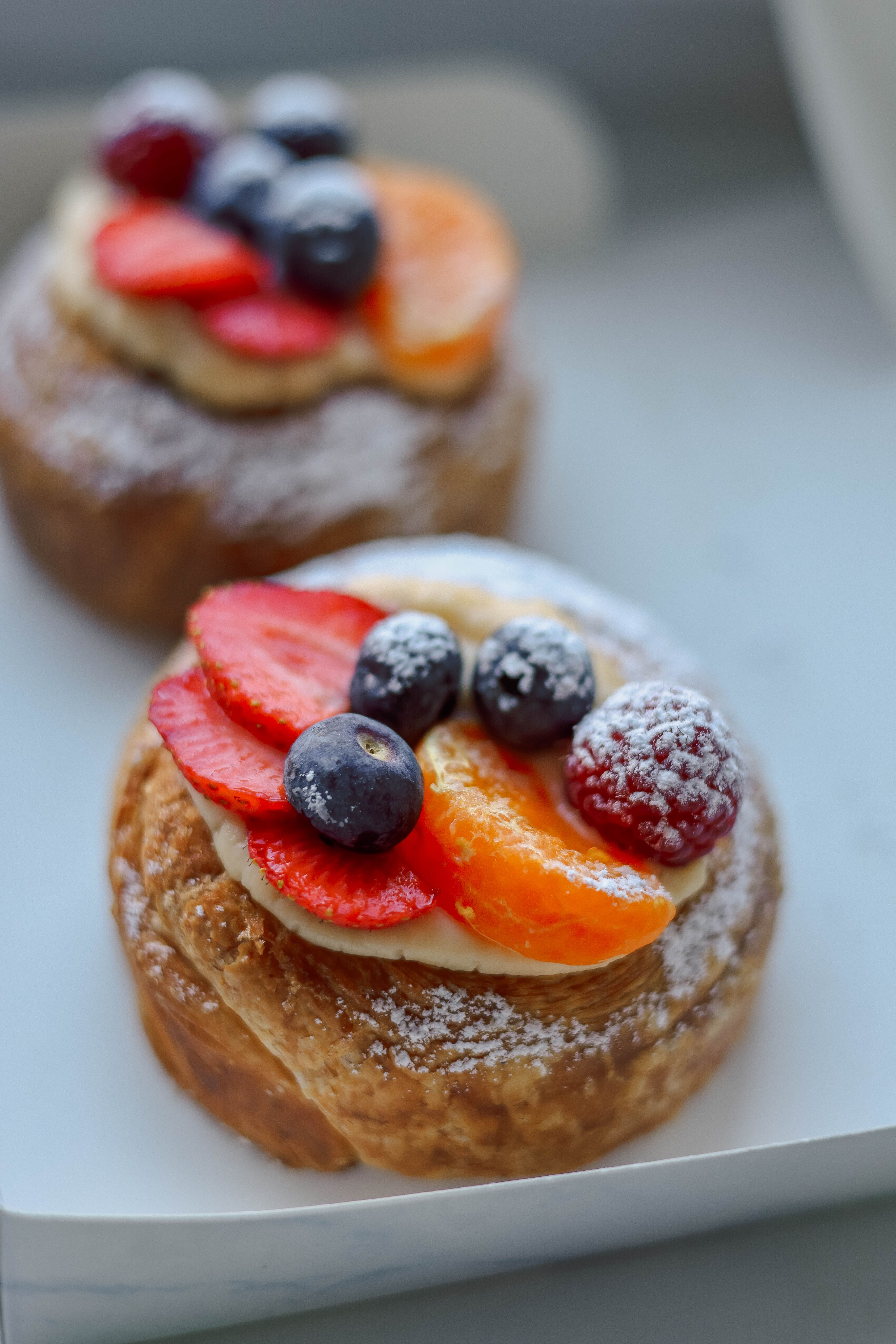 Delicious Fruit-Topped Pastries Close-Up · Free Stock Photo