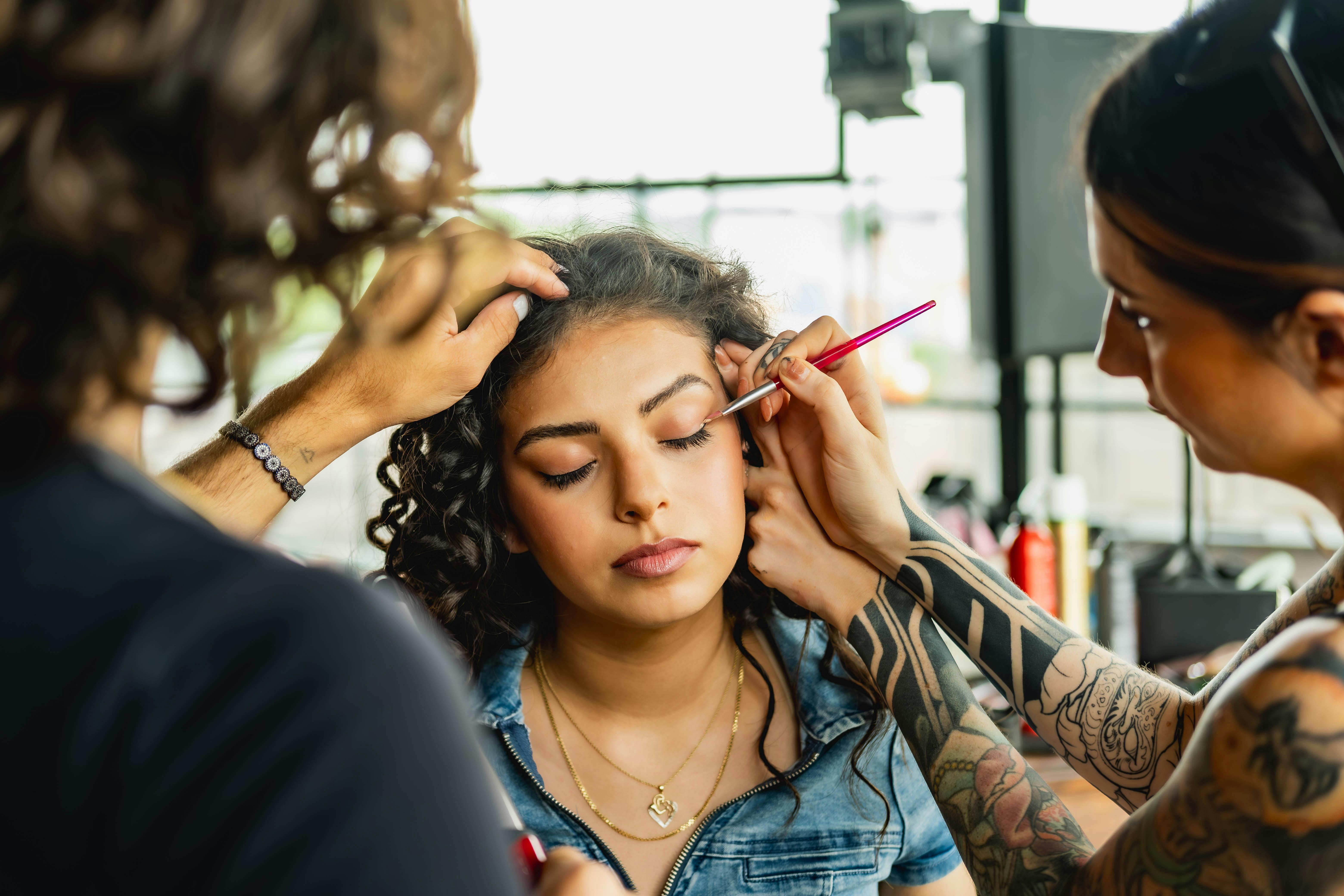 Makeup Artist Perfecting Look at Toronto Photo Studio · Free Stock Photo