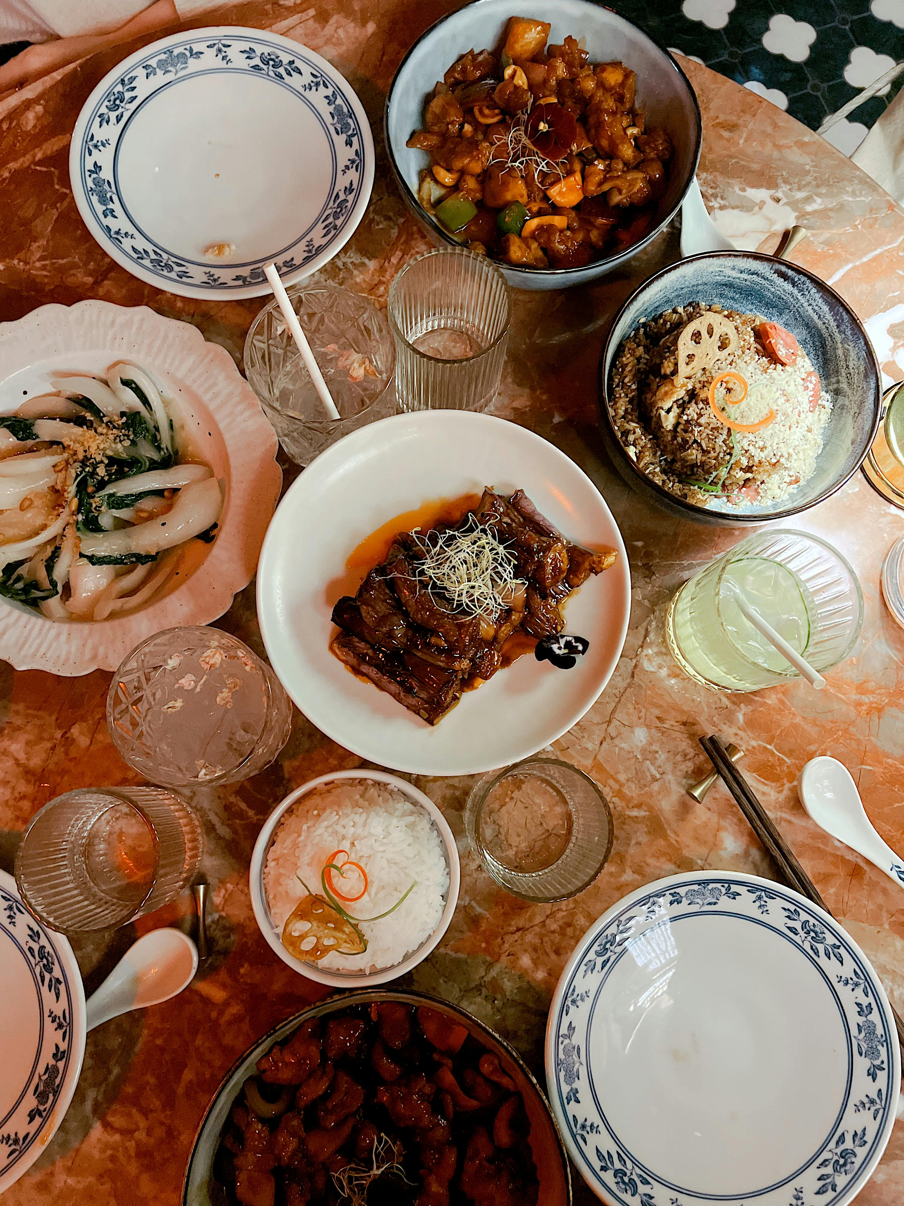 Elegant Dining Setup with Various Dishes · Free Stock Photo