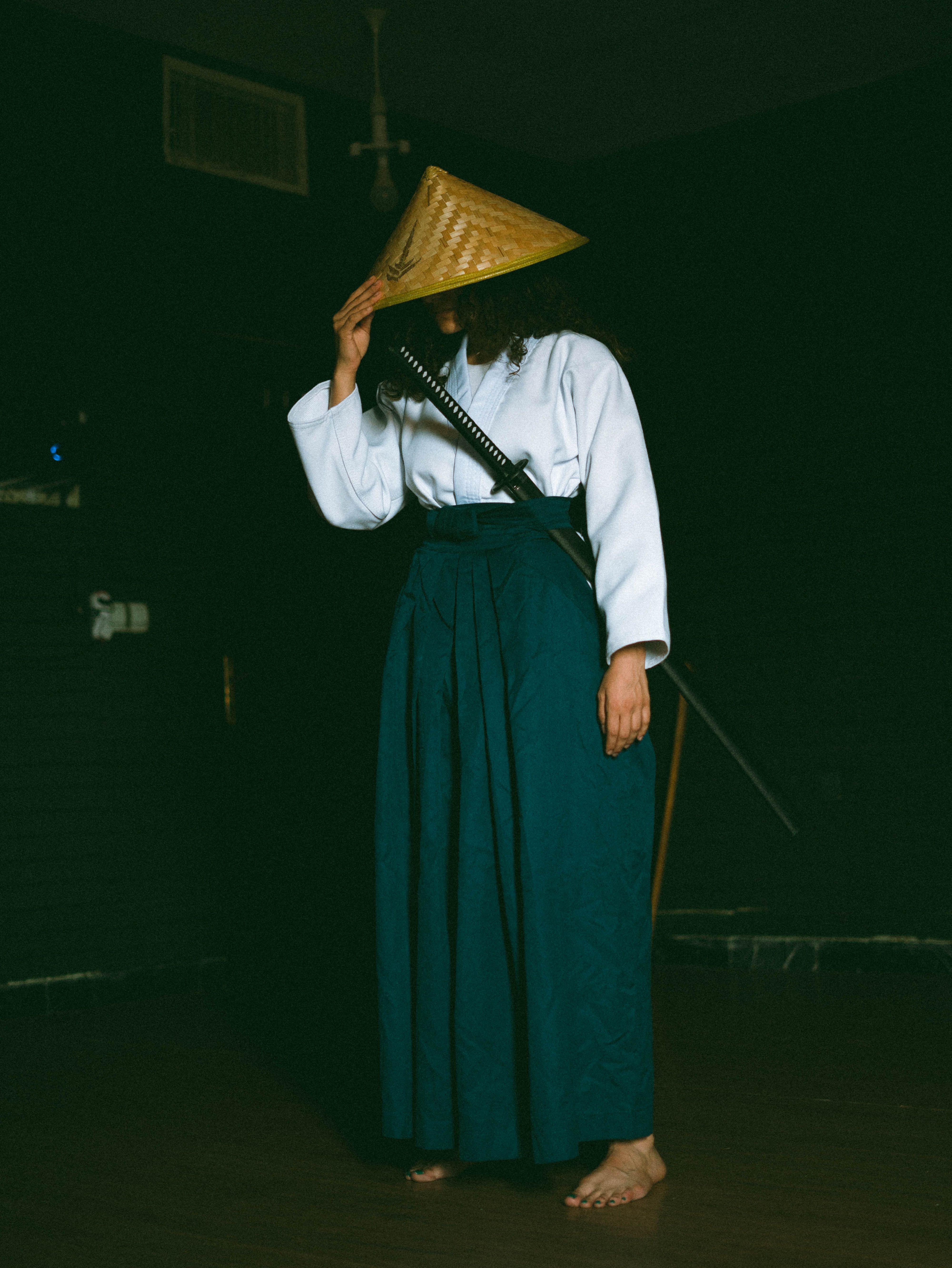 Samurai Style with Traditional Straw Hat and Katana · Free Stock Photo