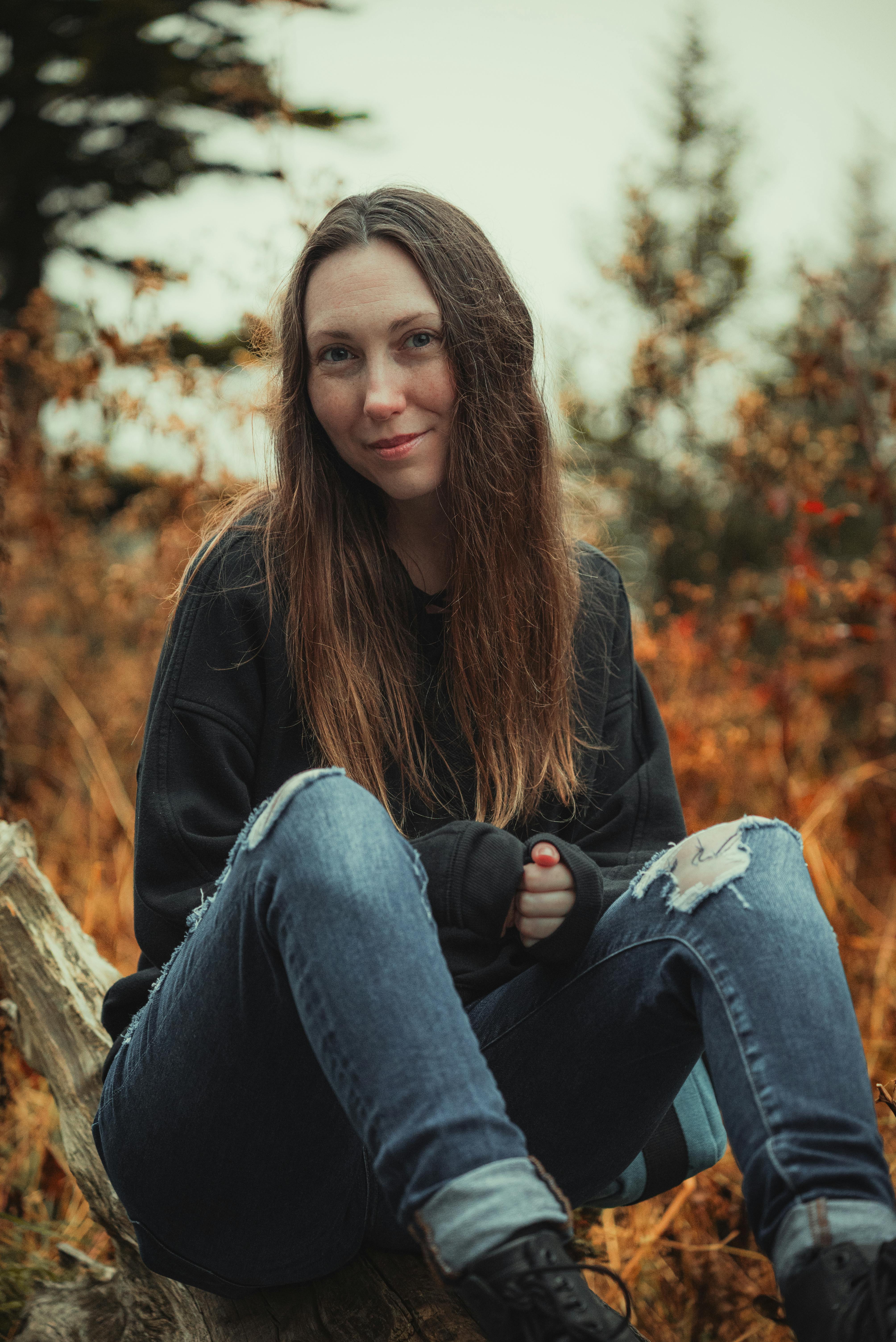 Young Woman in Autumn Forest Portrait · Free Stock Photo