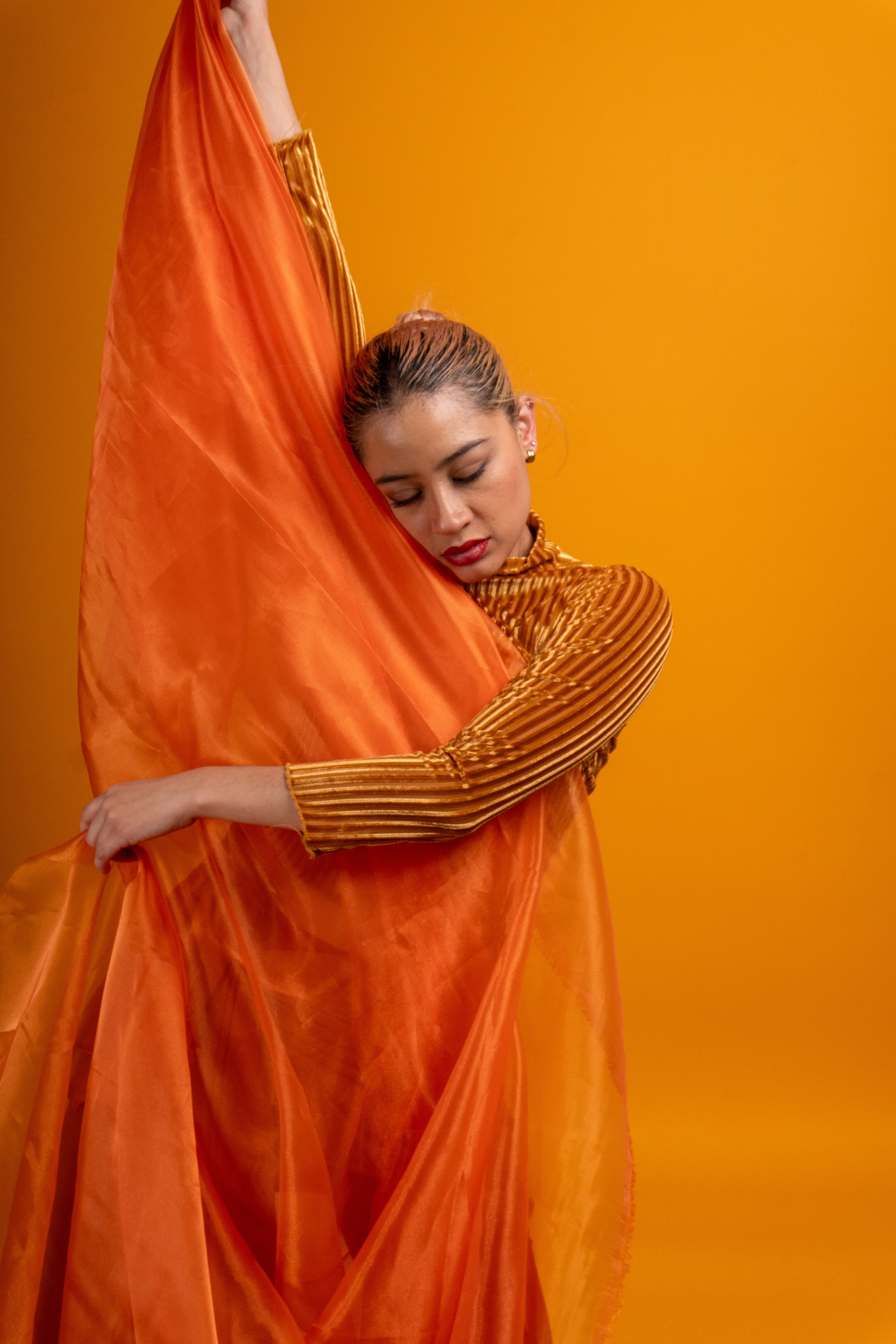 Elegant Ballet Dancer Posing with Orange Fabric · Free Stock Photo