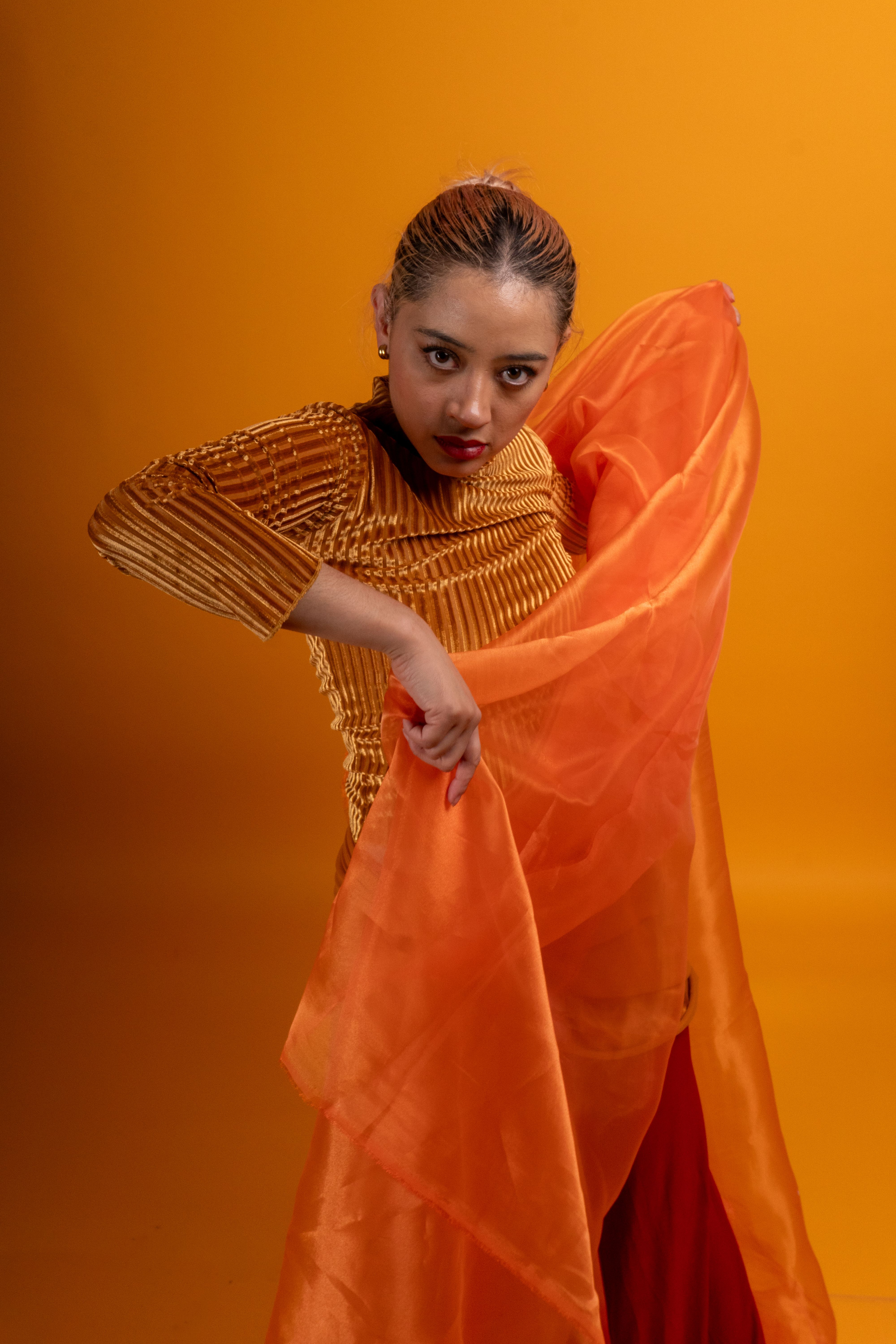 Dynamic Portrait of Contemporary Dancer in Orange · Free Stock Photo