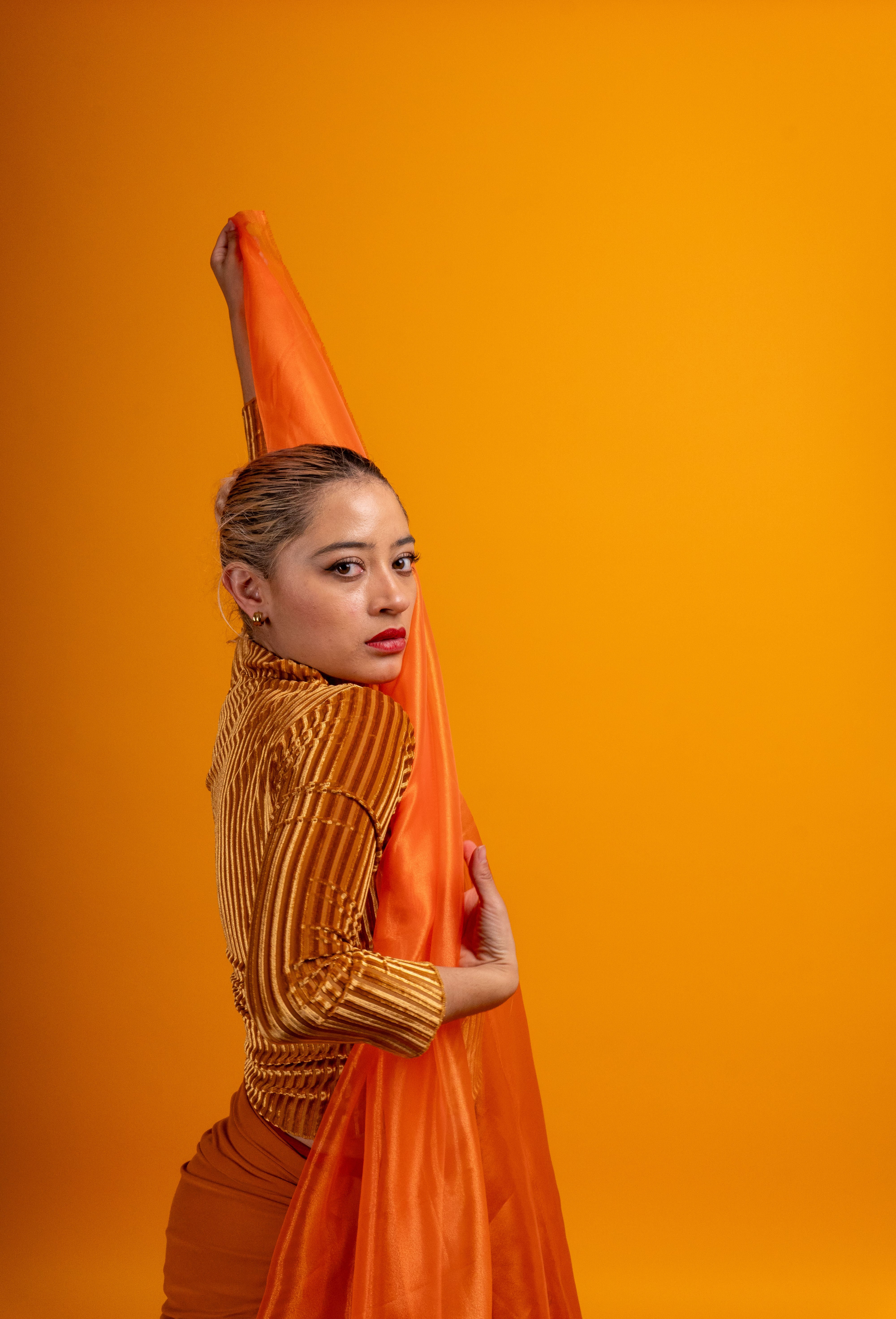 Elegant Contemporary Dancer Posing with Orange Cloth · Free Stock Photo
