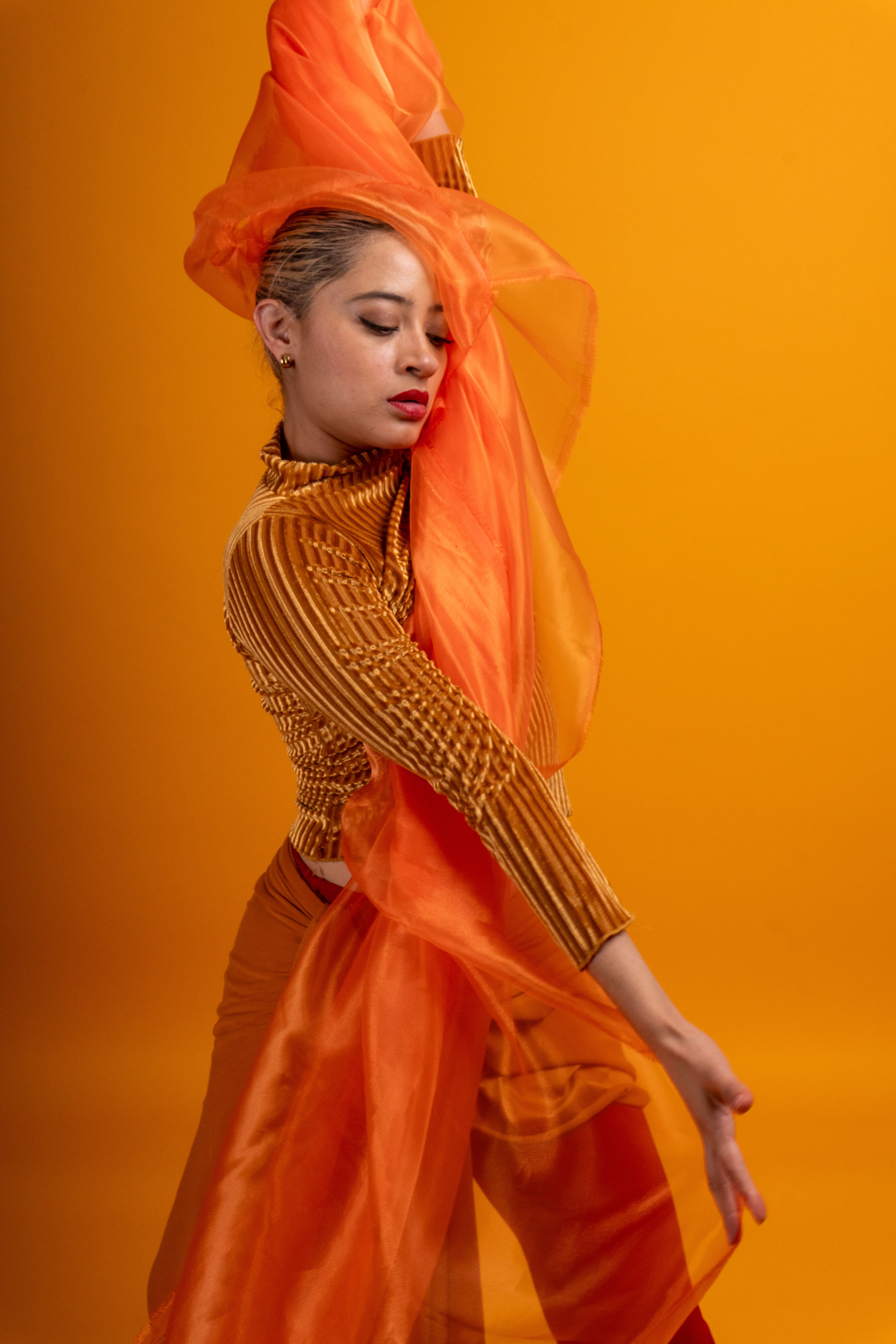 Elegant Contemporary Dancer in Vibrant Orange · Free Stock Photo
