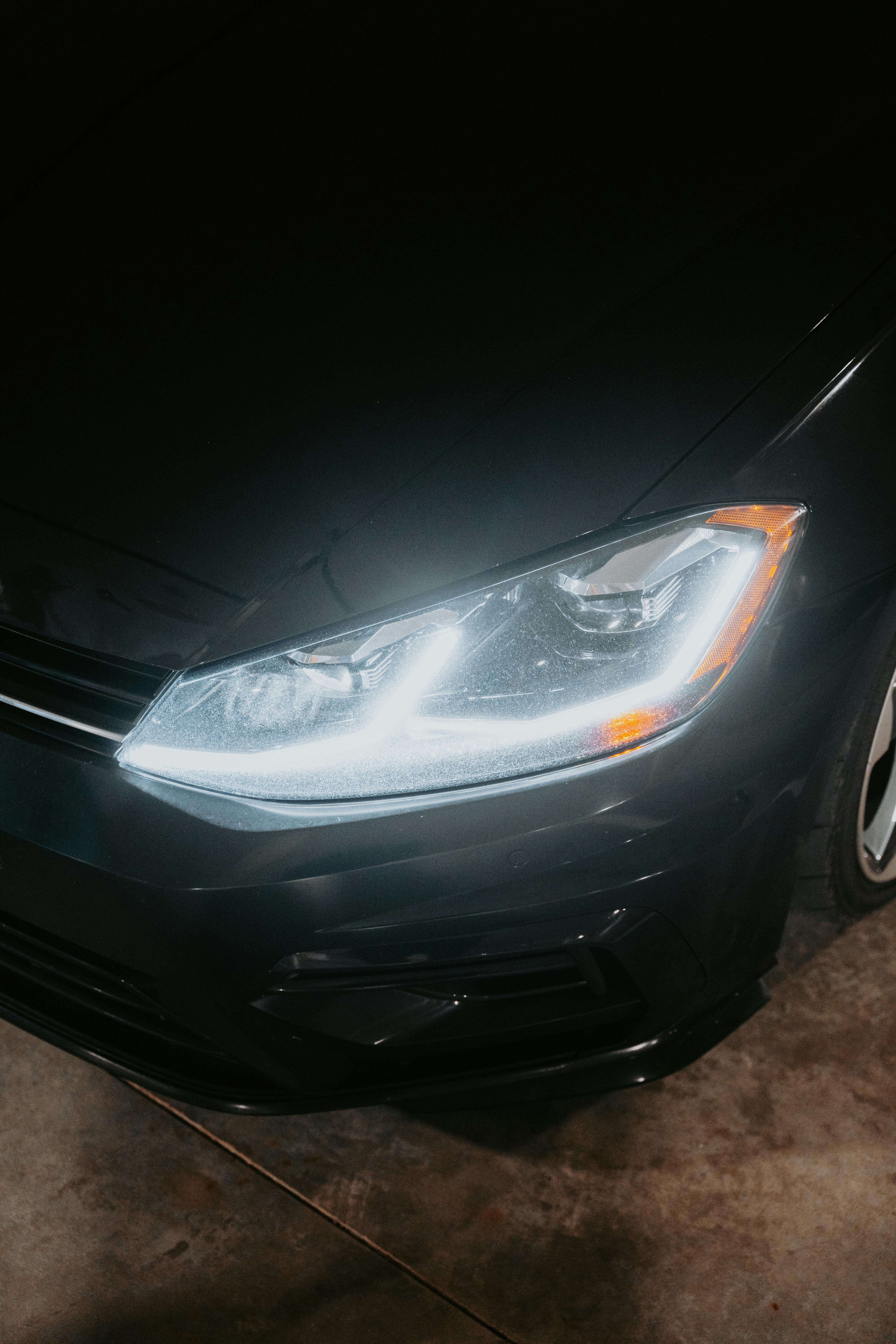 Close-up of a Car Headlight at Night · Free Stock Photo