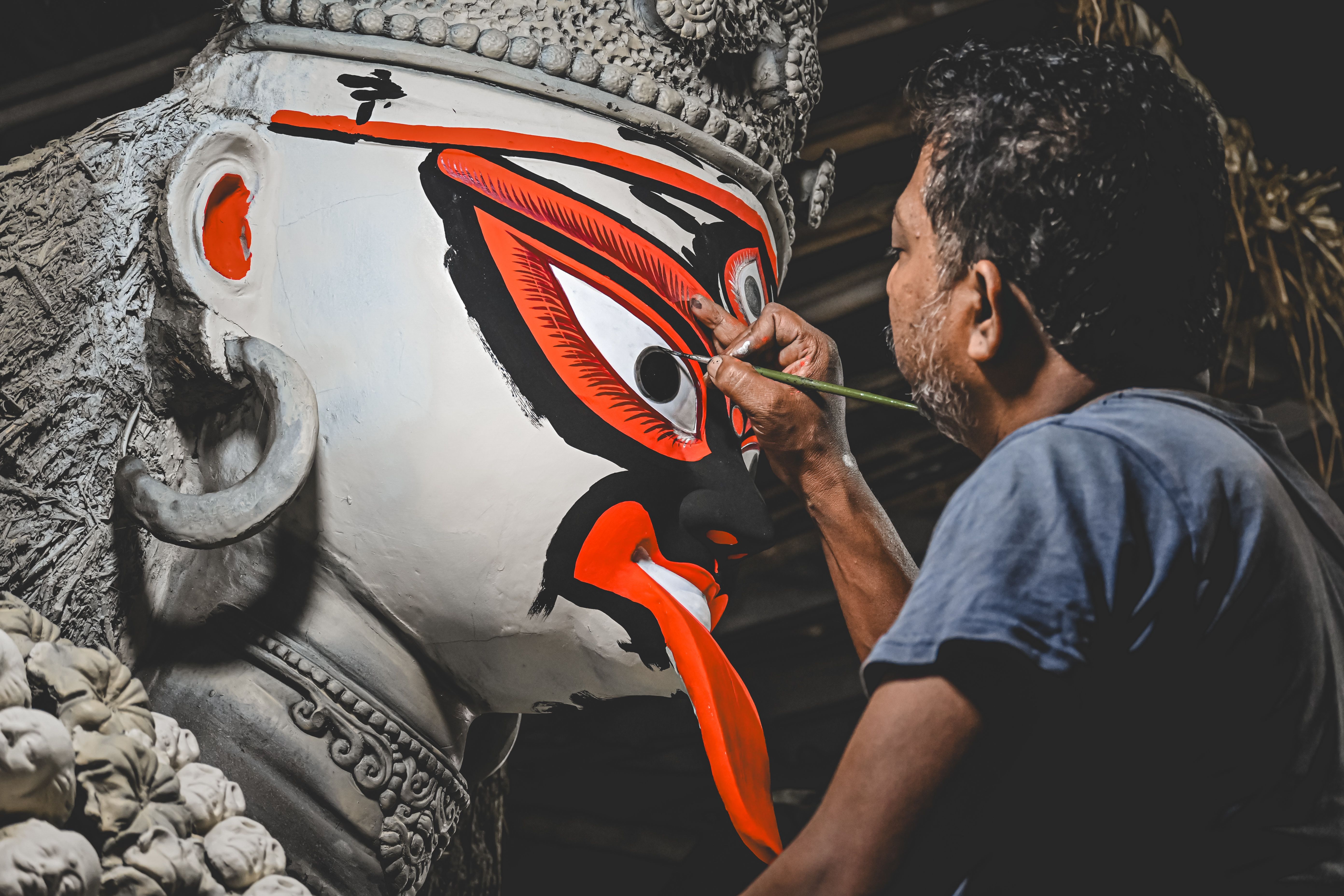 Artist Painting Goddess Kali Idol in Kolkata Workshop · Free Stock Photo
