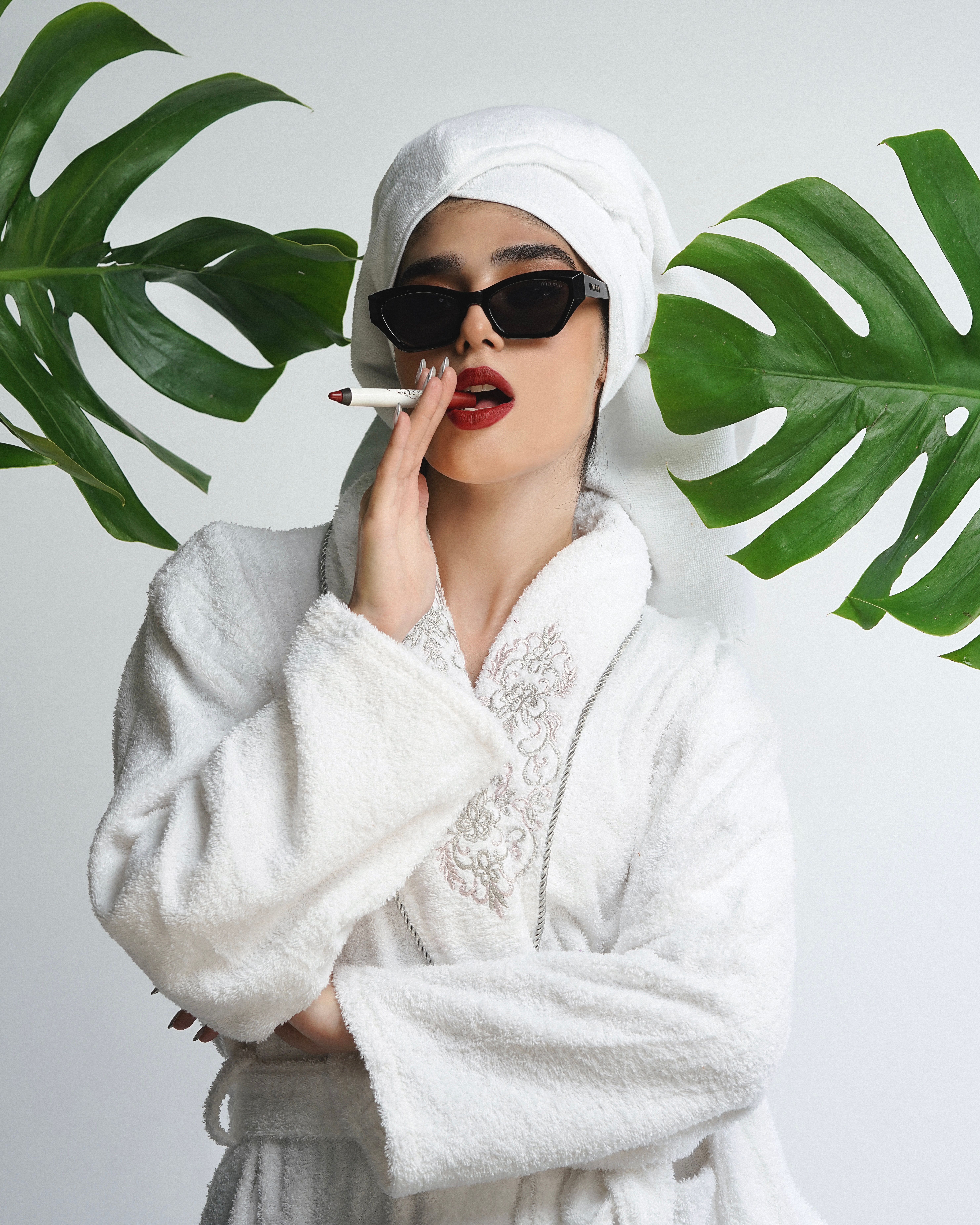 Chic Woman in Spa Attire with Tropical Vibe · Free Stock Photo