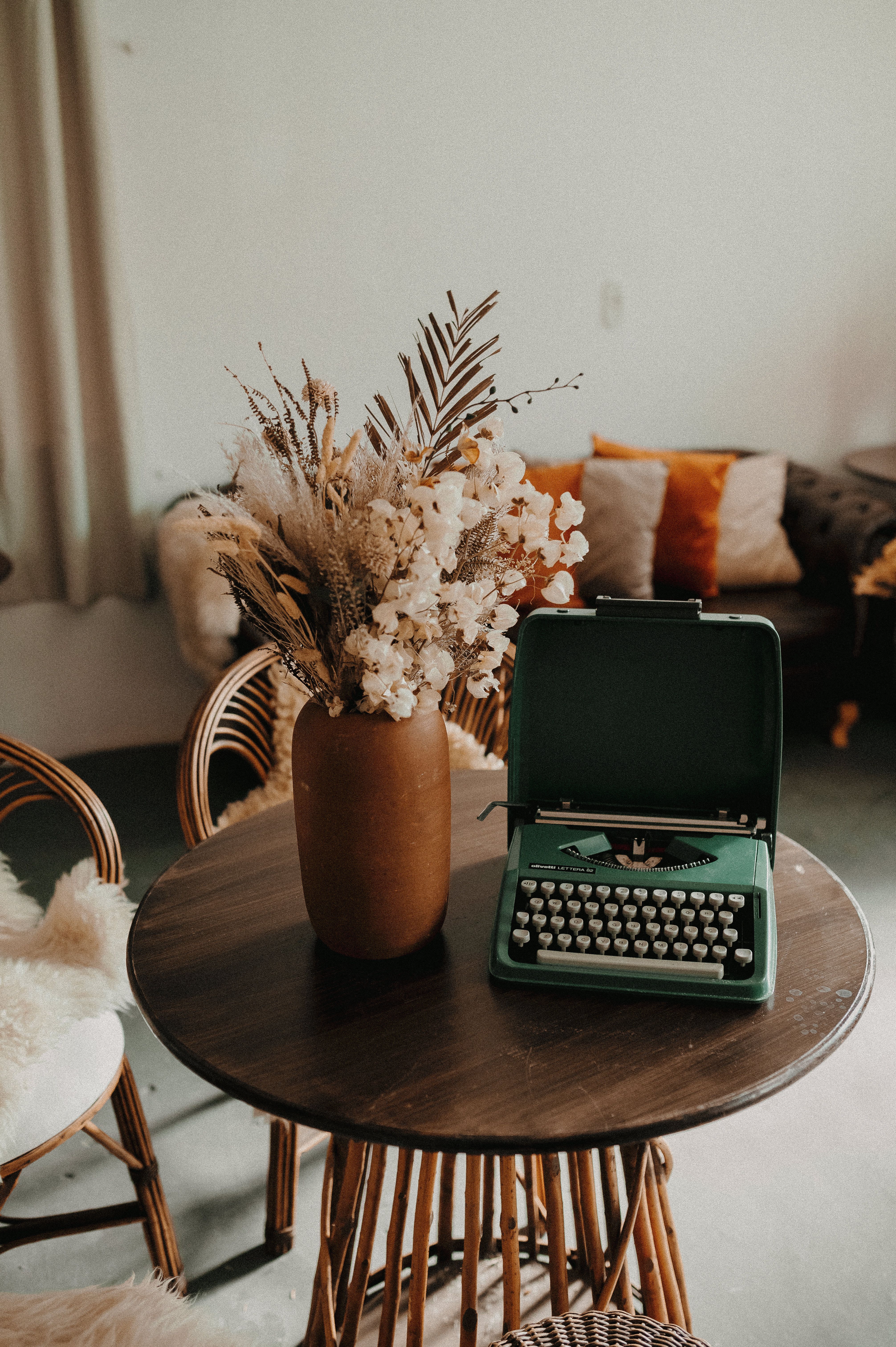 Cozy Vintage Interior with Typewriter and Flowers · Free Stock Photo