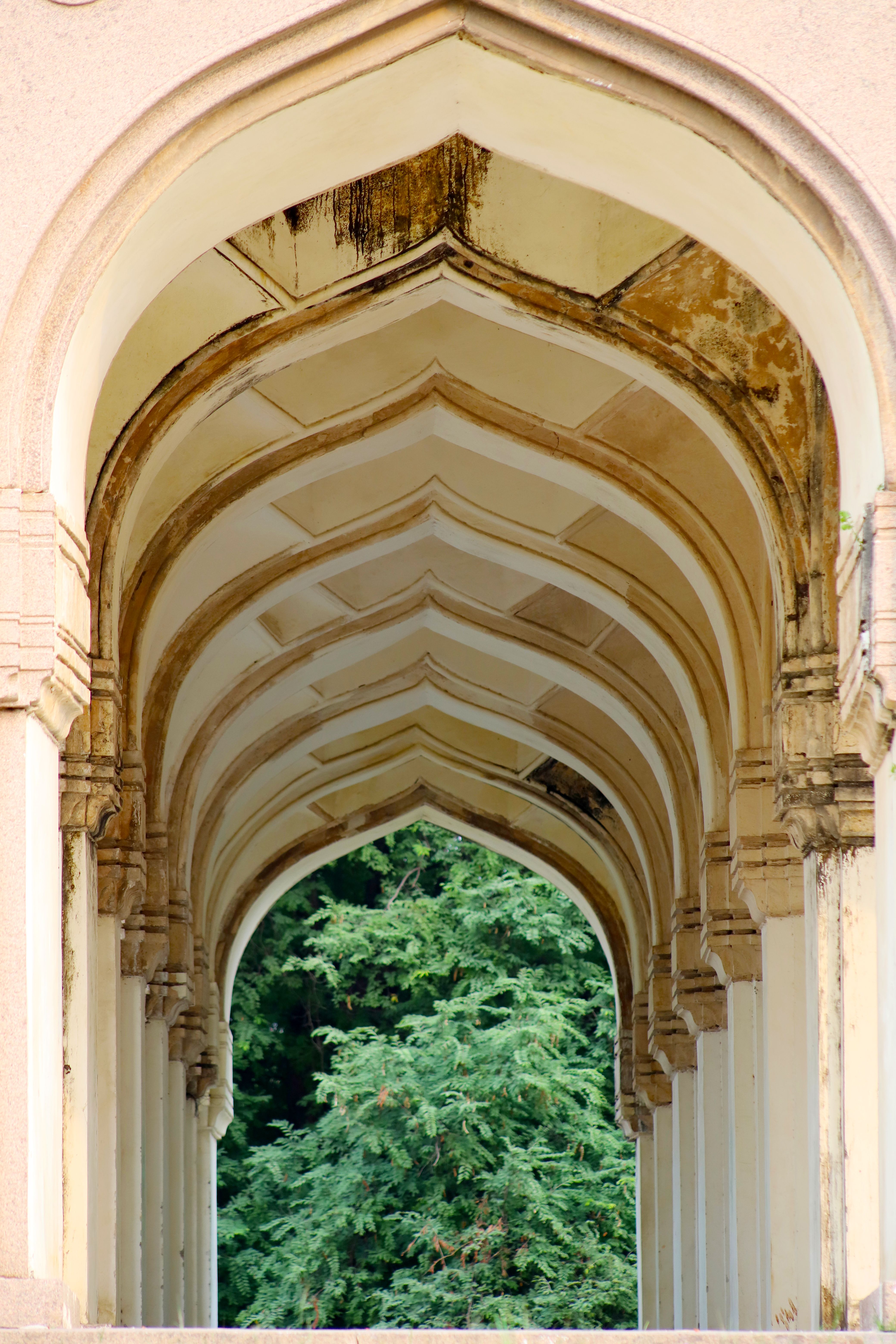 Elegant Arched Corridor with Nature View · Free Stock Photo
