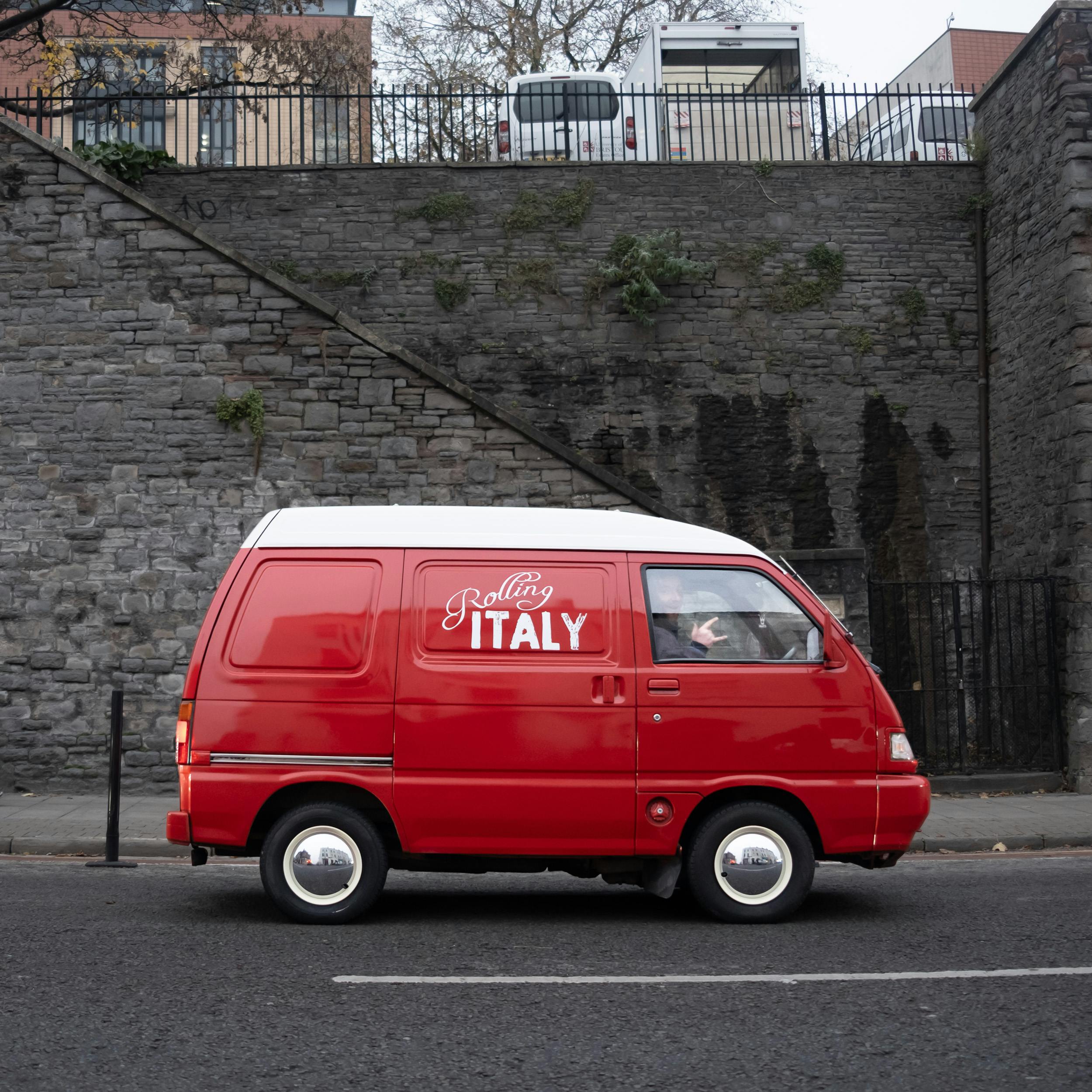 Red Camper Van on Bristol Street · Free Stock Photo