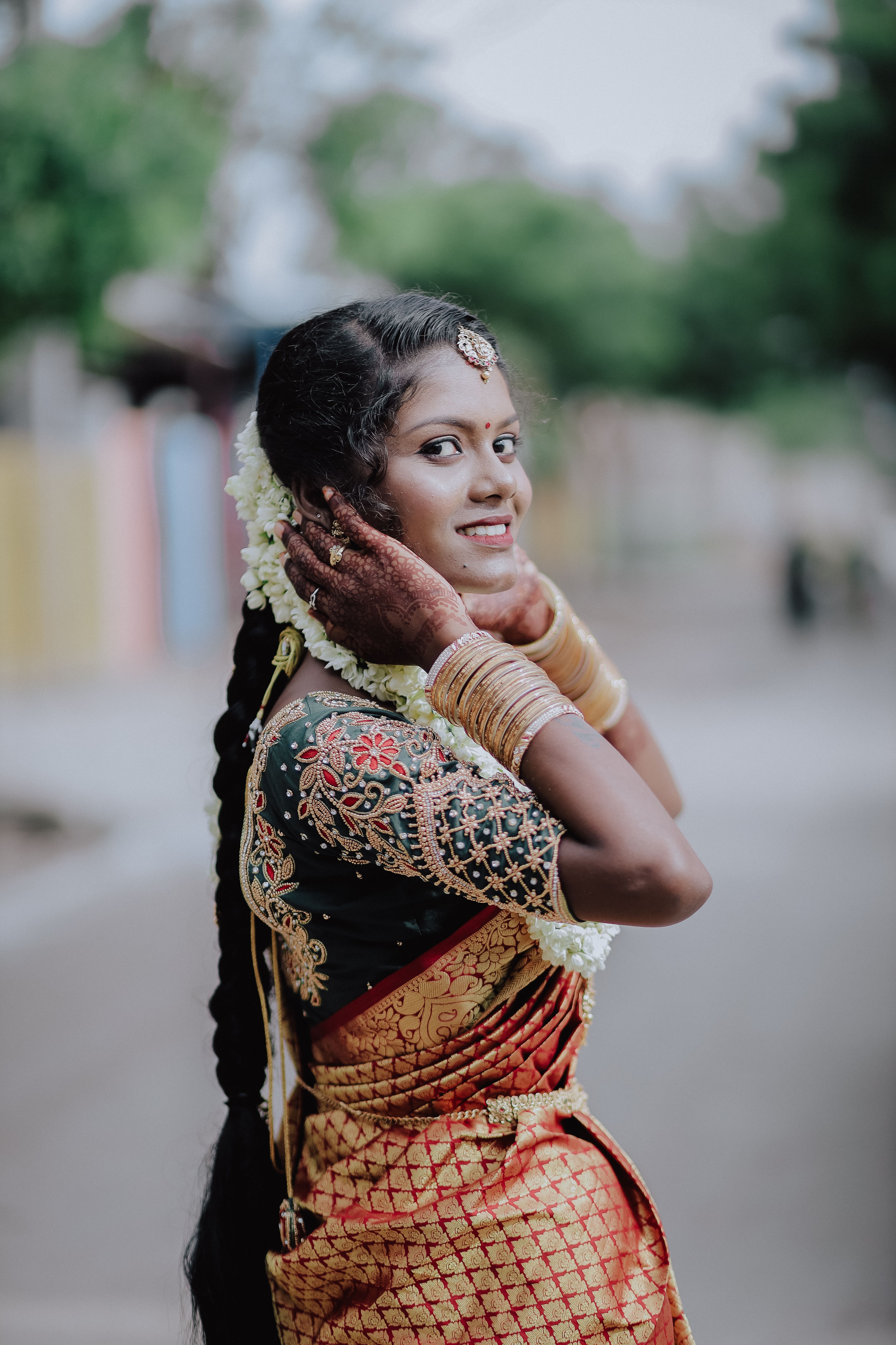 Elegant Indian Bride in Traditional Attire Outdoors · Free Stock Photo
