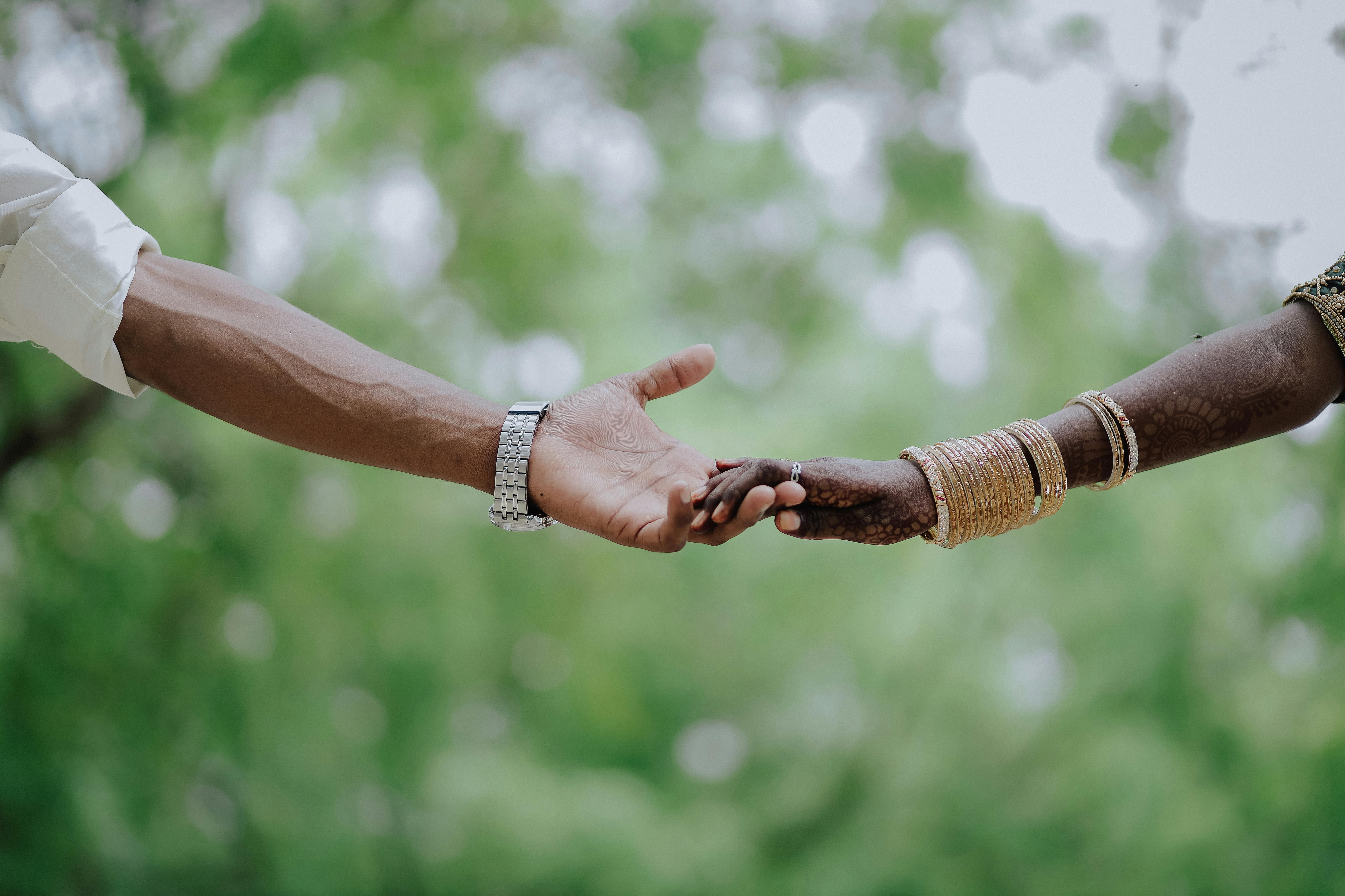 Elegant Indian Wedding Hand Holding Outdoors · Free Stock Photo