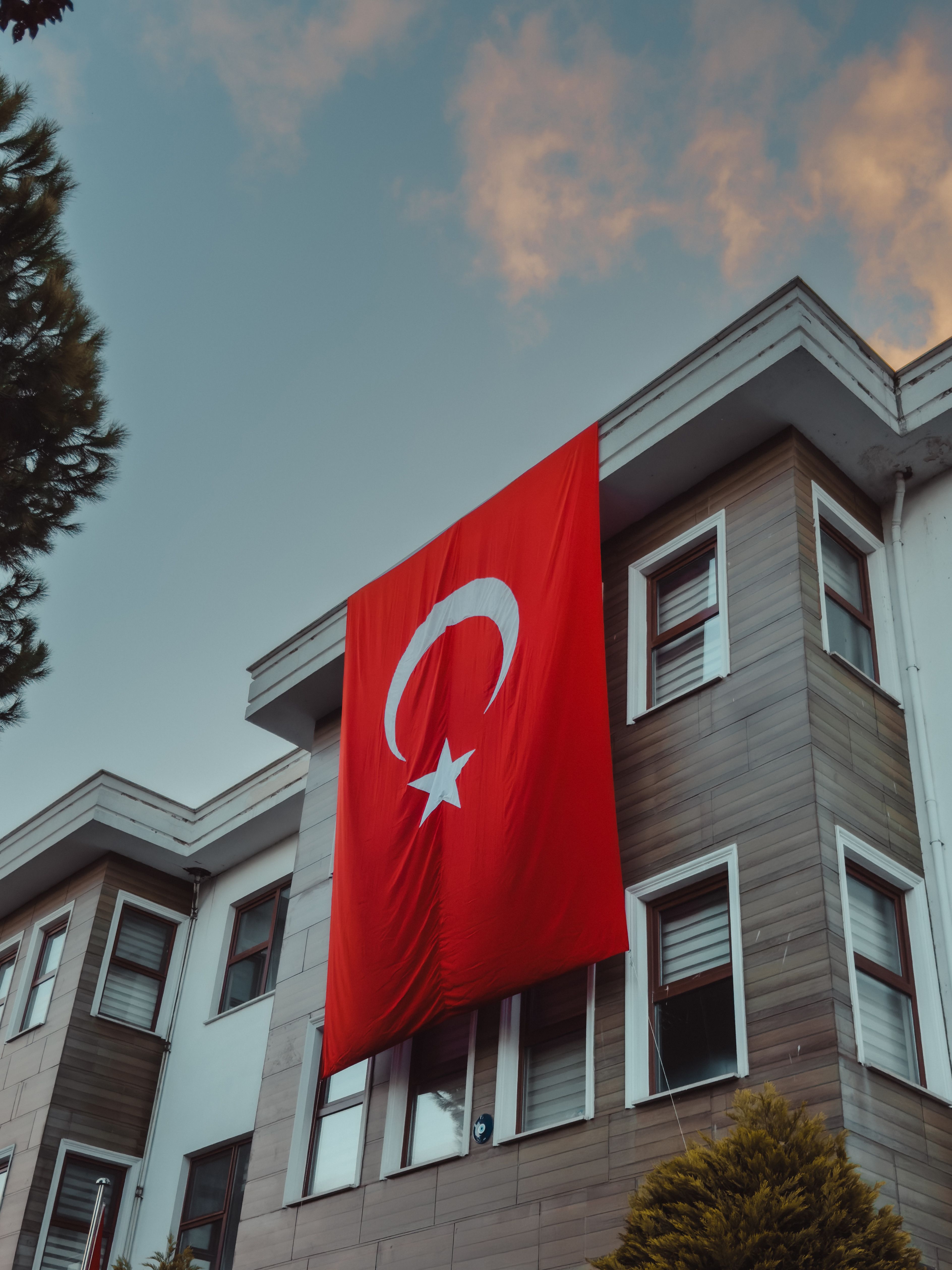 Large Turkish Flag on Residential Building · Free Stock Photo