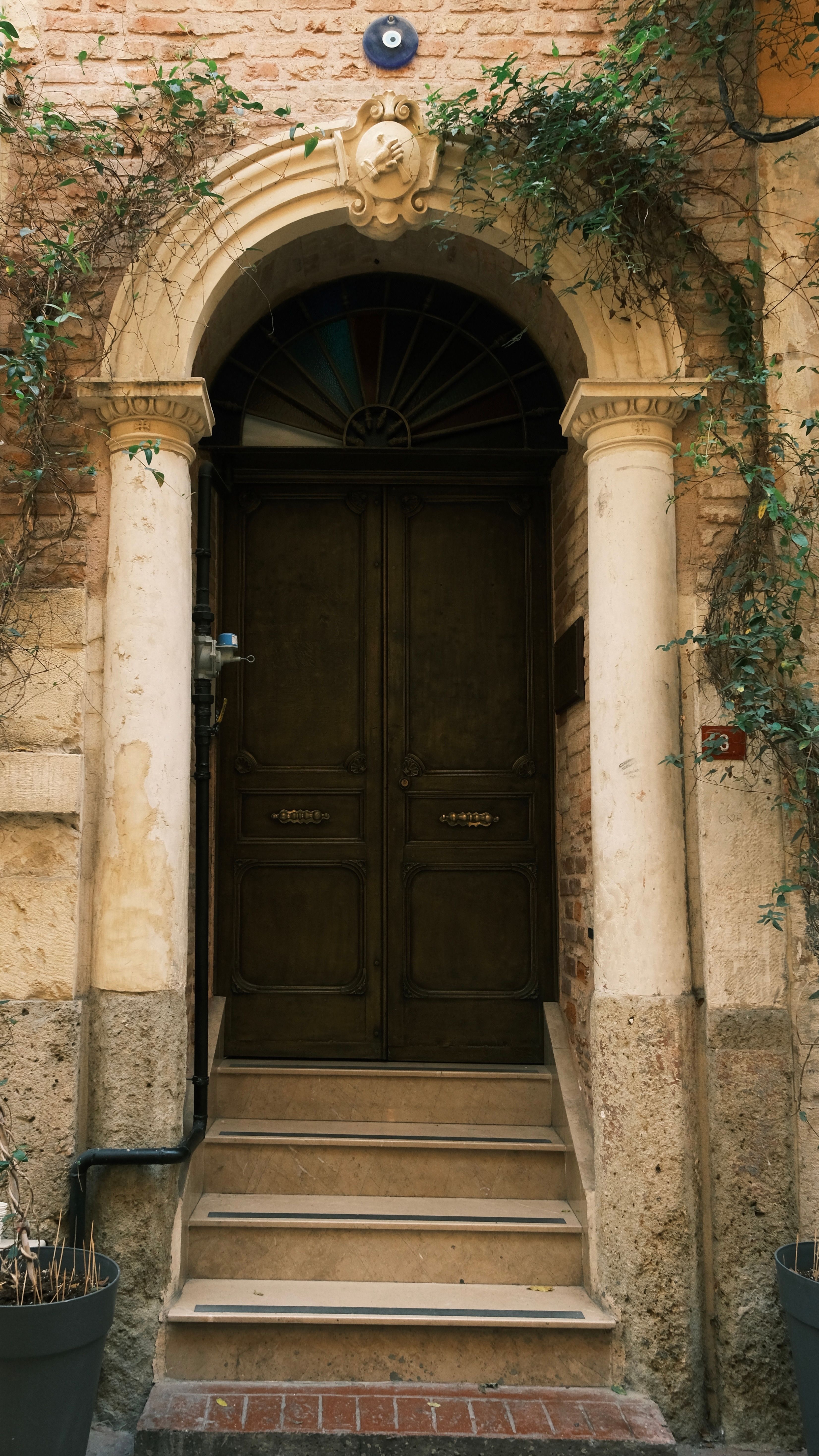 Rustic Italian Doorway with Arched Entrance · Free Stock Photo