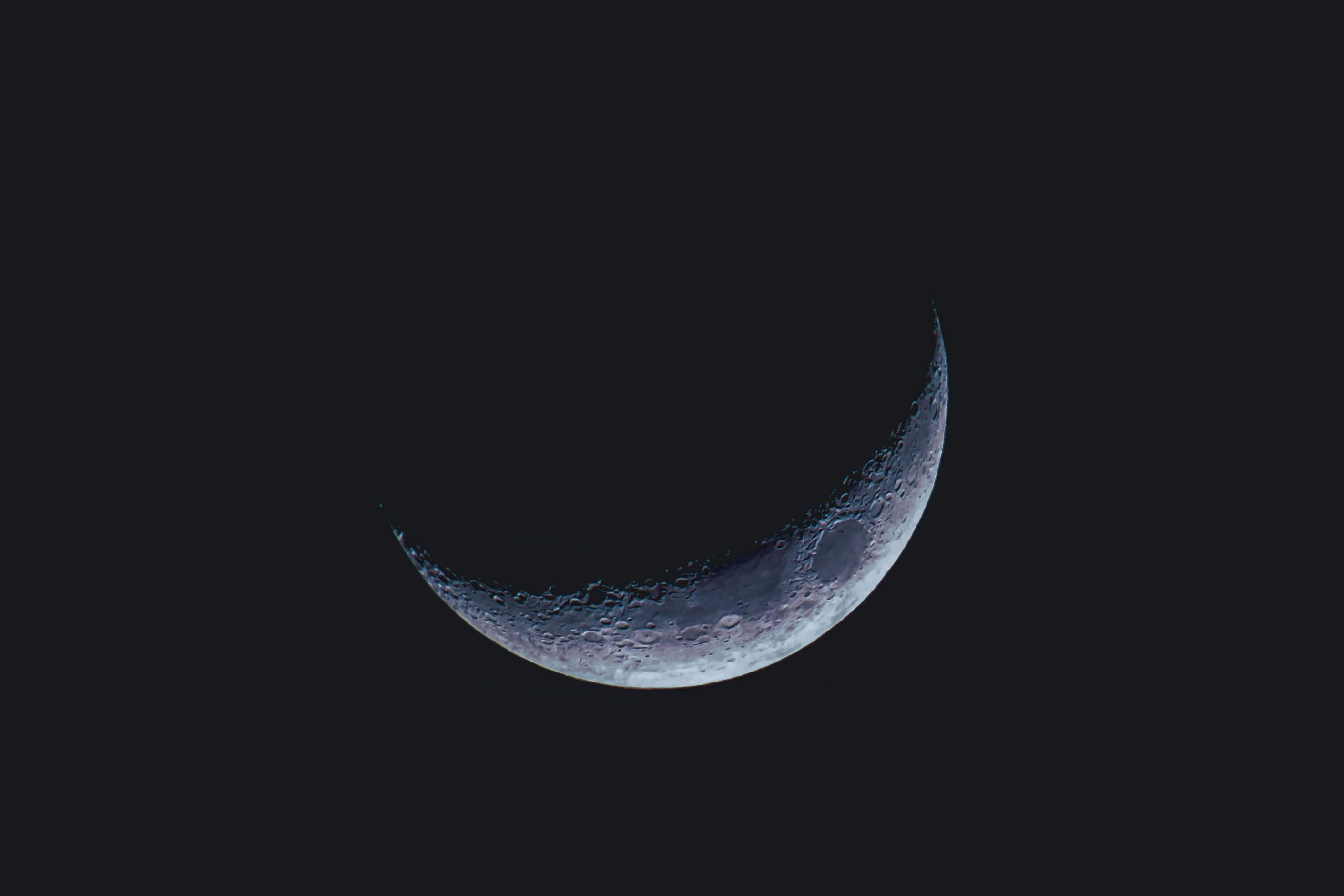 Stunning Crescent Moon in a Starless Night Sky · Free Stock Photo