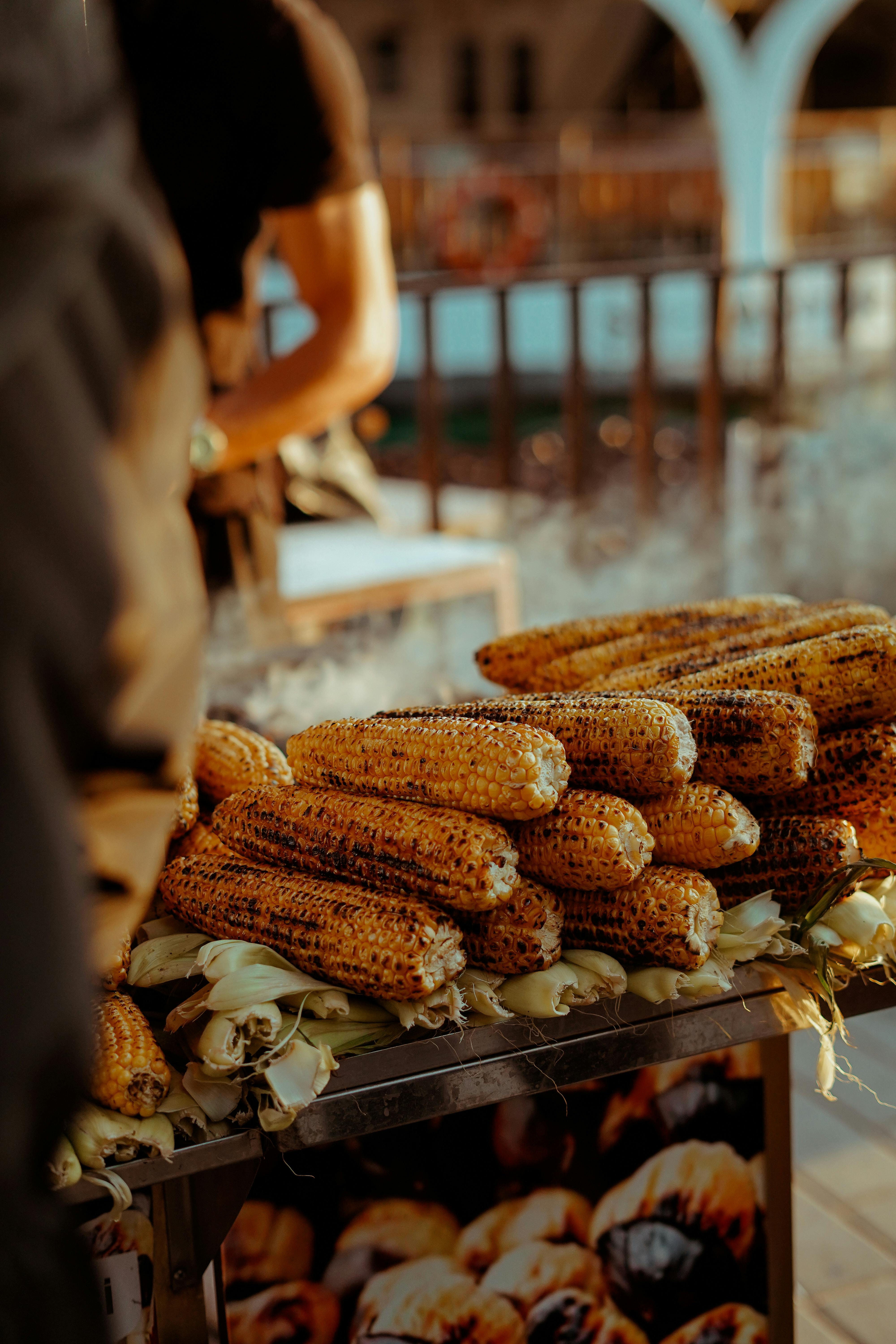 Grilled Corn Street Food Stall at Sunset · Free Stock Photo