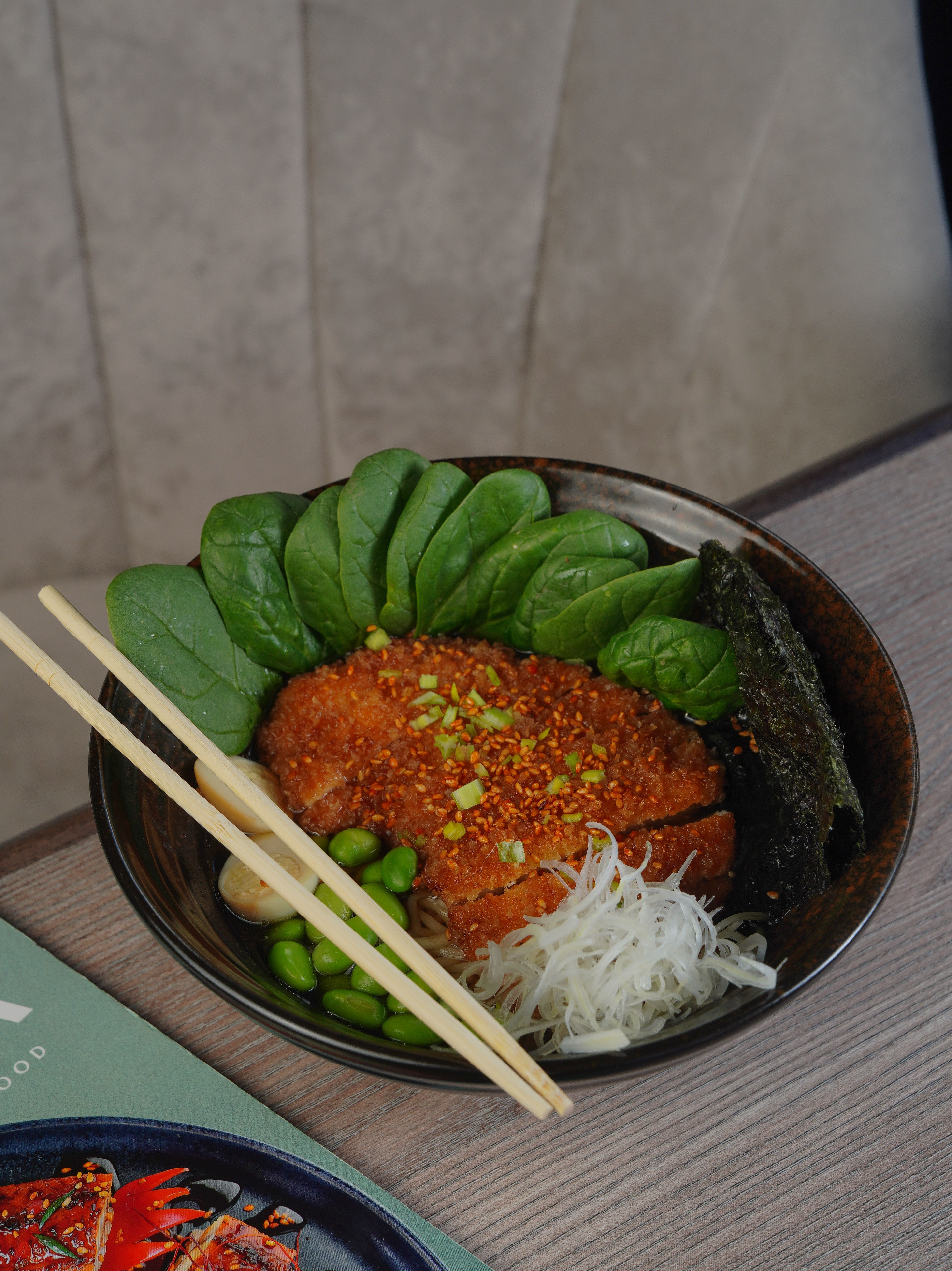 Delicious Asian Fusion Bowl with Chopsticks · Free Stock Photo
