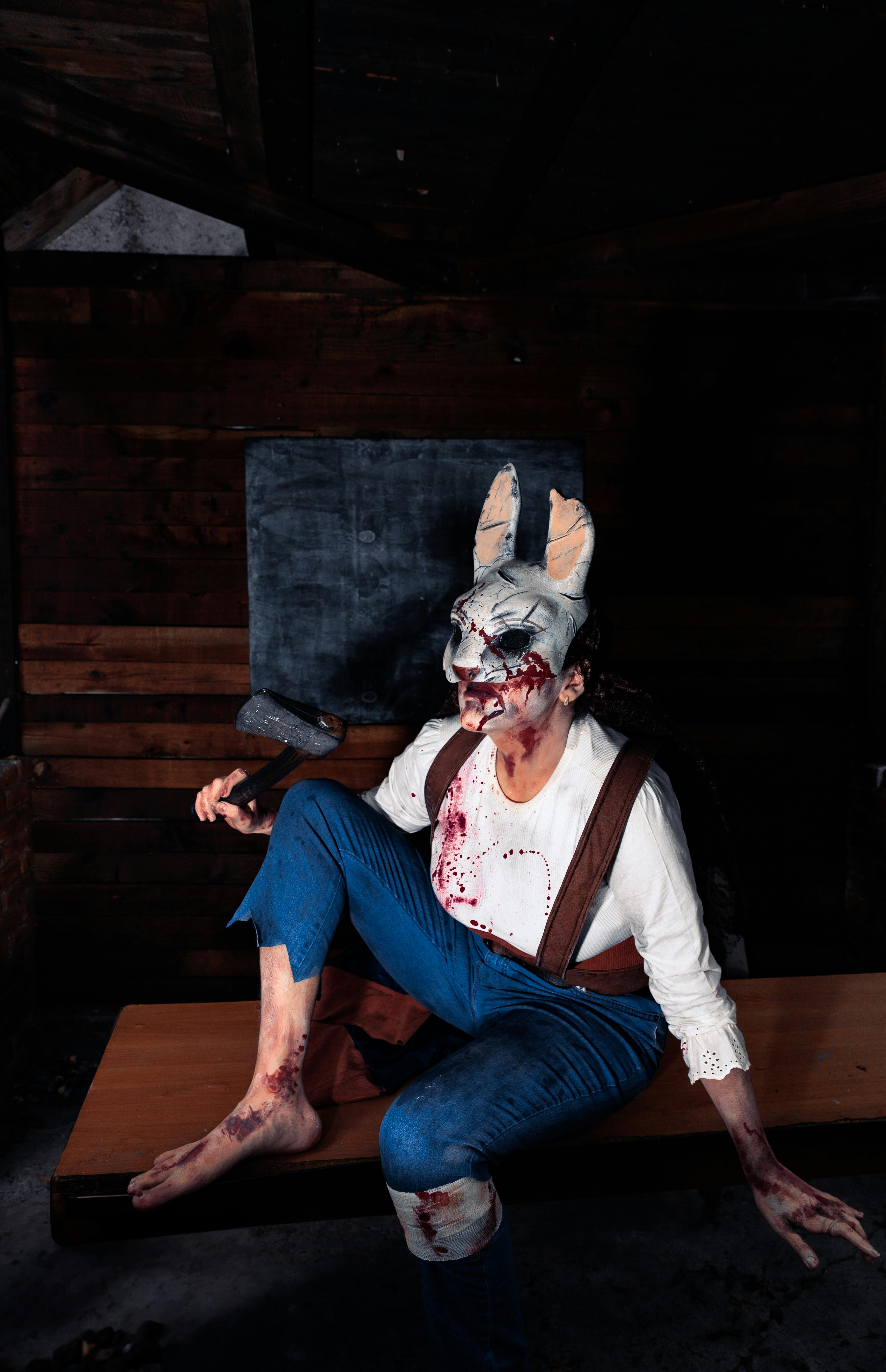 Creepy Costume of Bloody Rabbit with Hammer · Free Stock Photo