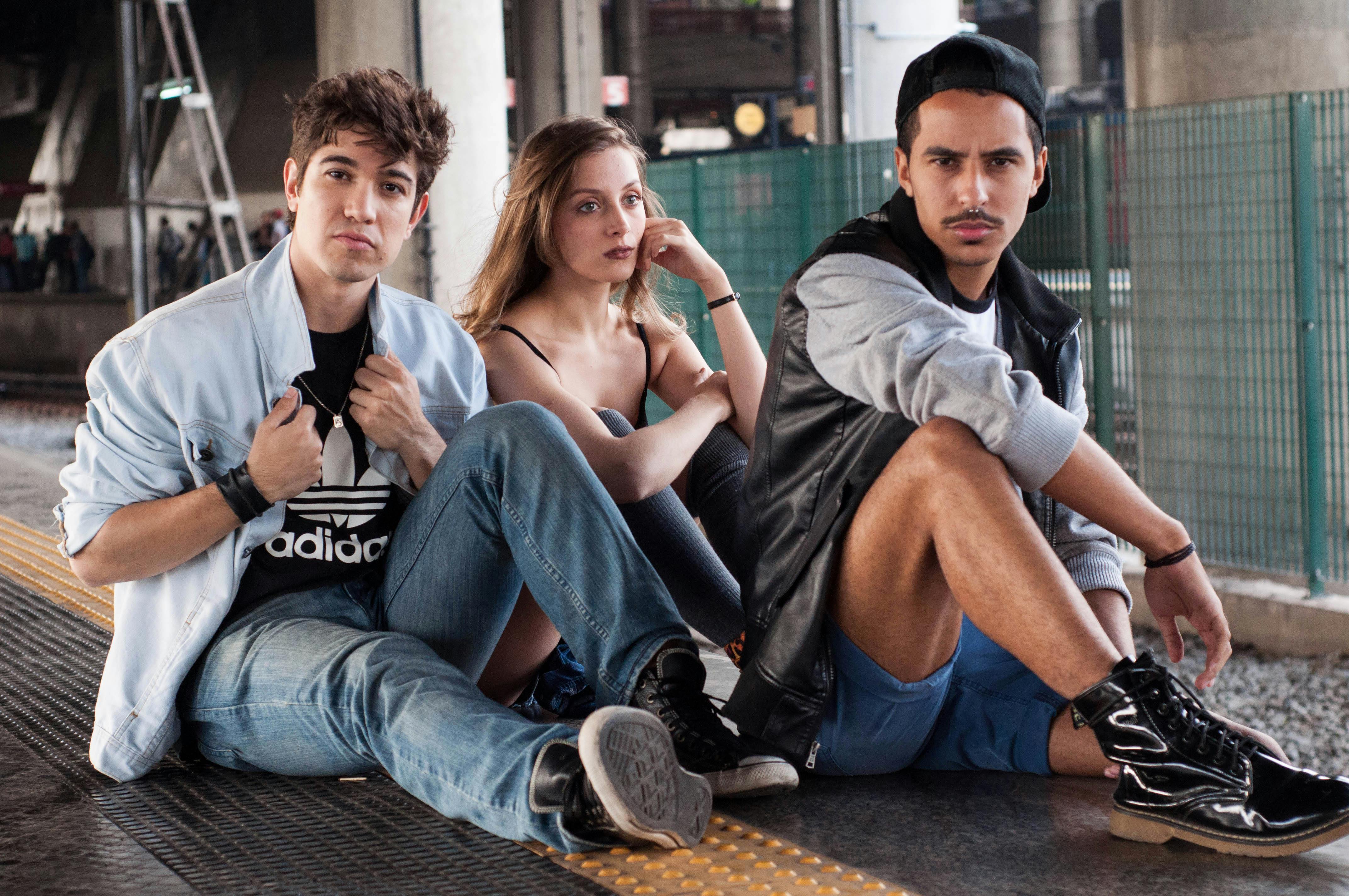 Urban fashion photoshoot with three young adults · Free Stock Photo