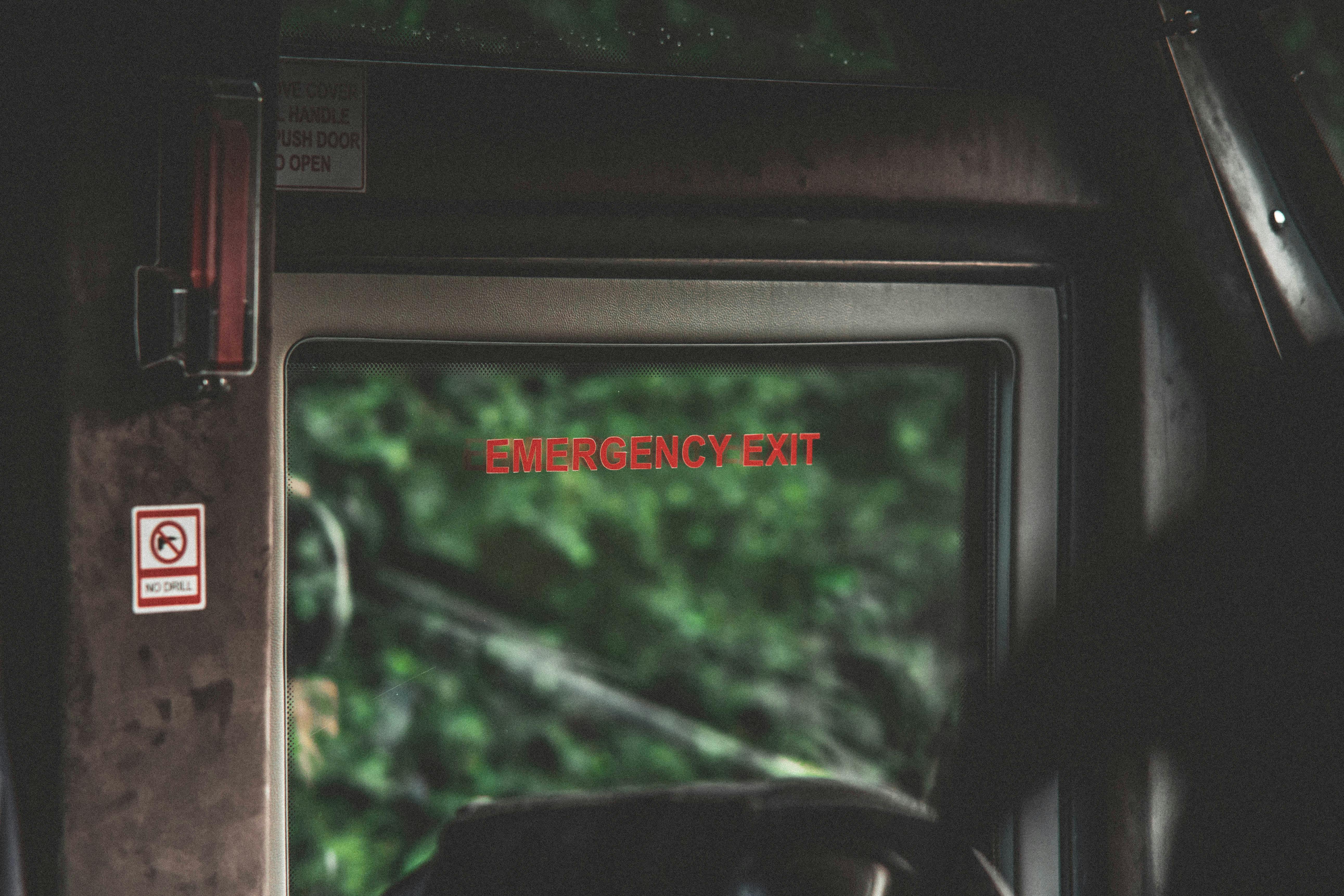 Emergency Exit Sign Inside Vehicle · Free Stock Photo
