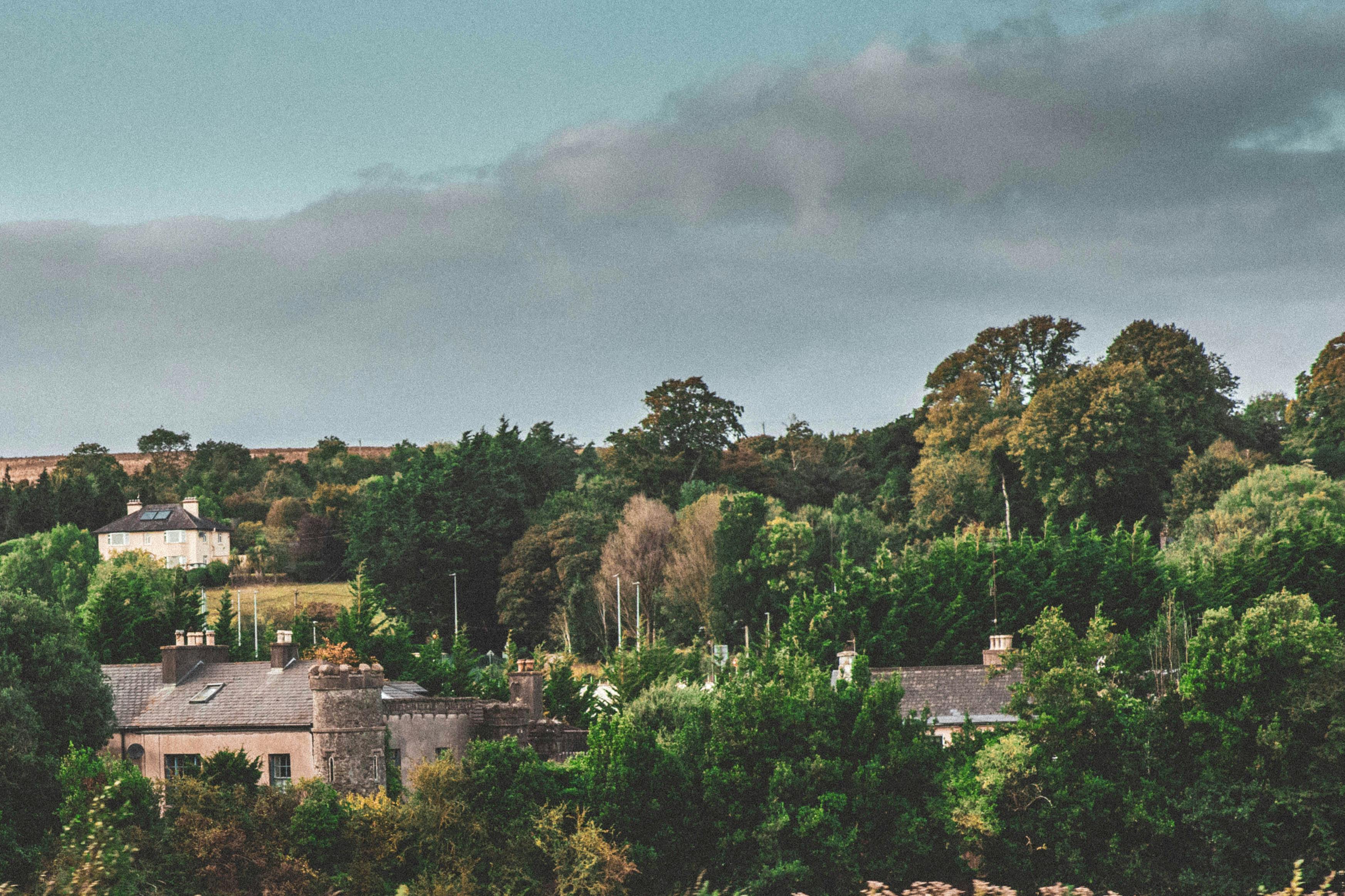 Scenic Irish Countryside with Historic Buildings · Free Stock Photo