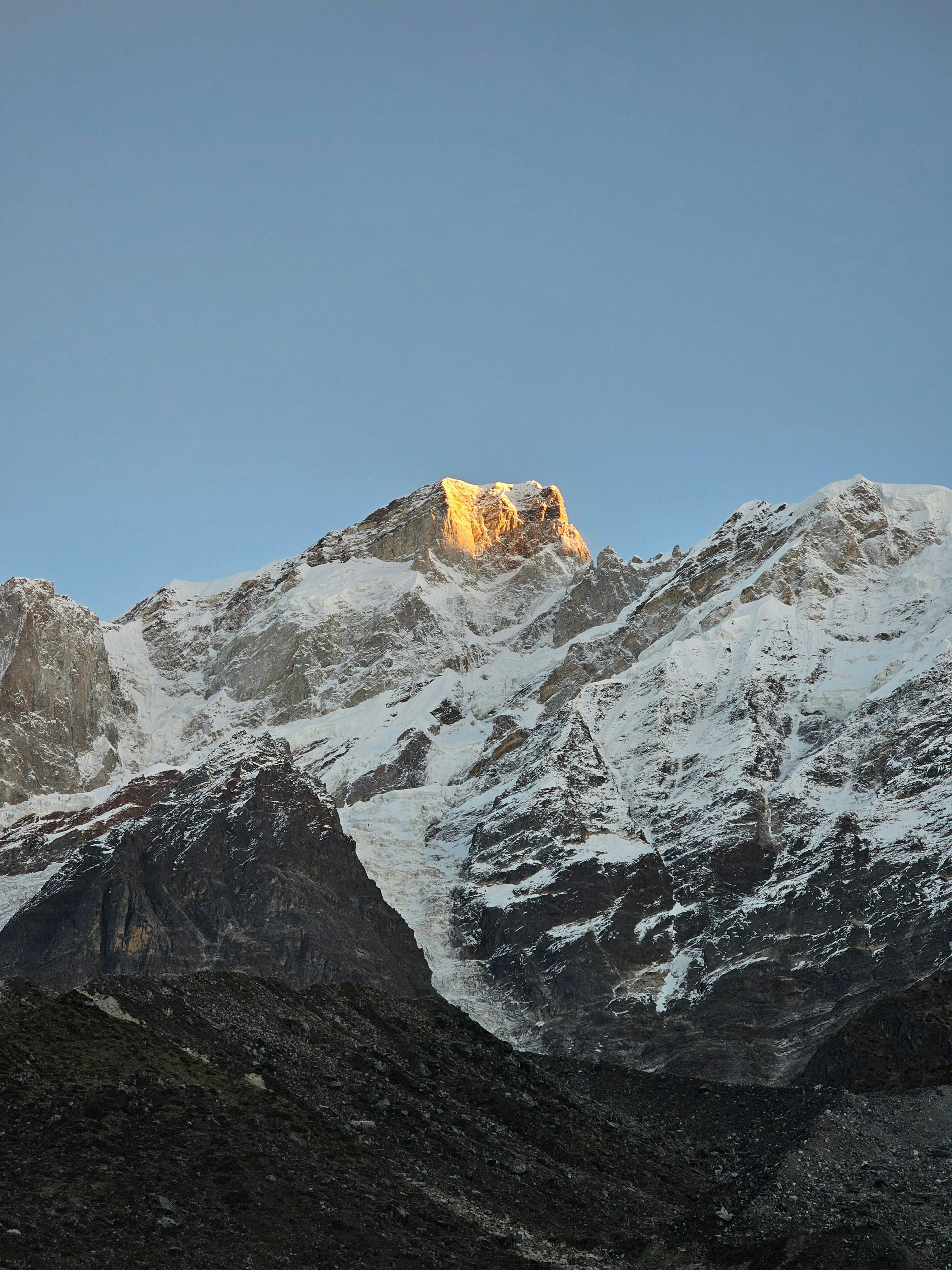 Sunlit Himalayan Snow-Capped Peaks Landscape · Free Stock Photo