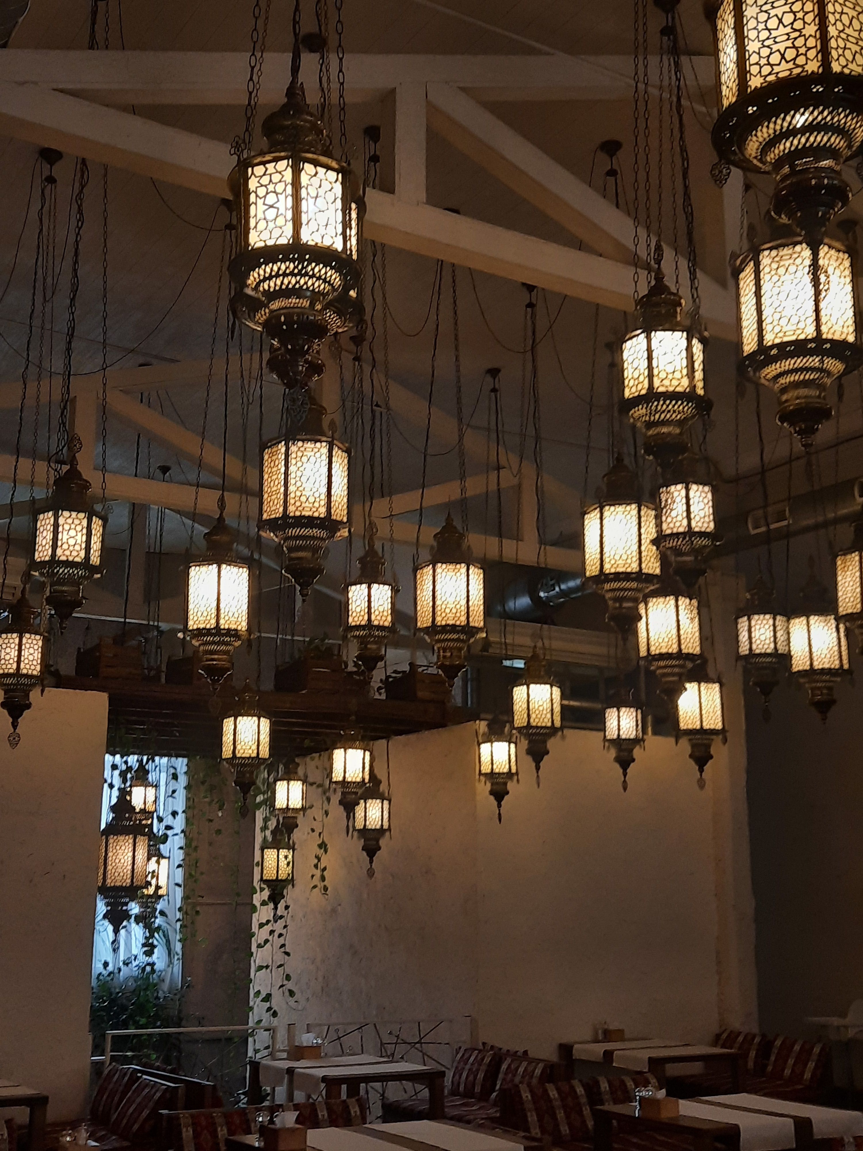 Elegant Hanging Lanterns in Cozy Cafe Setting · Free Stock Photo
