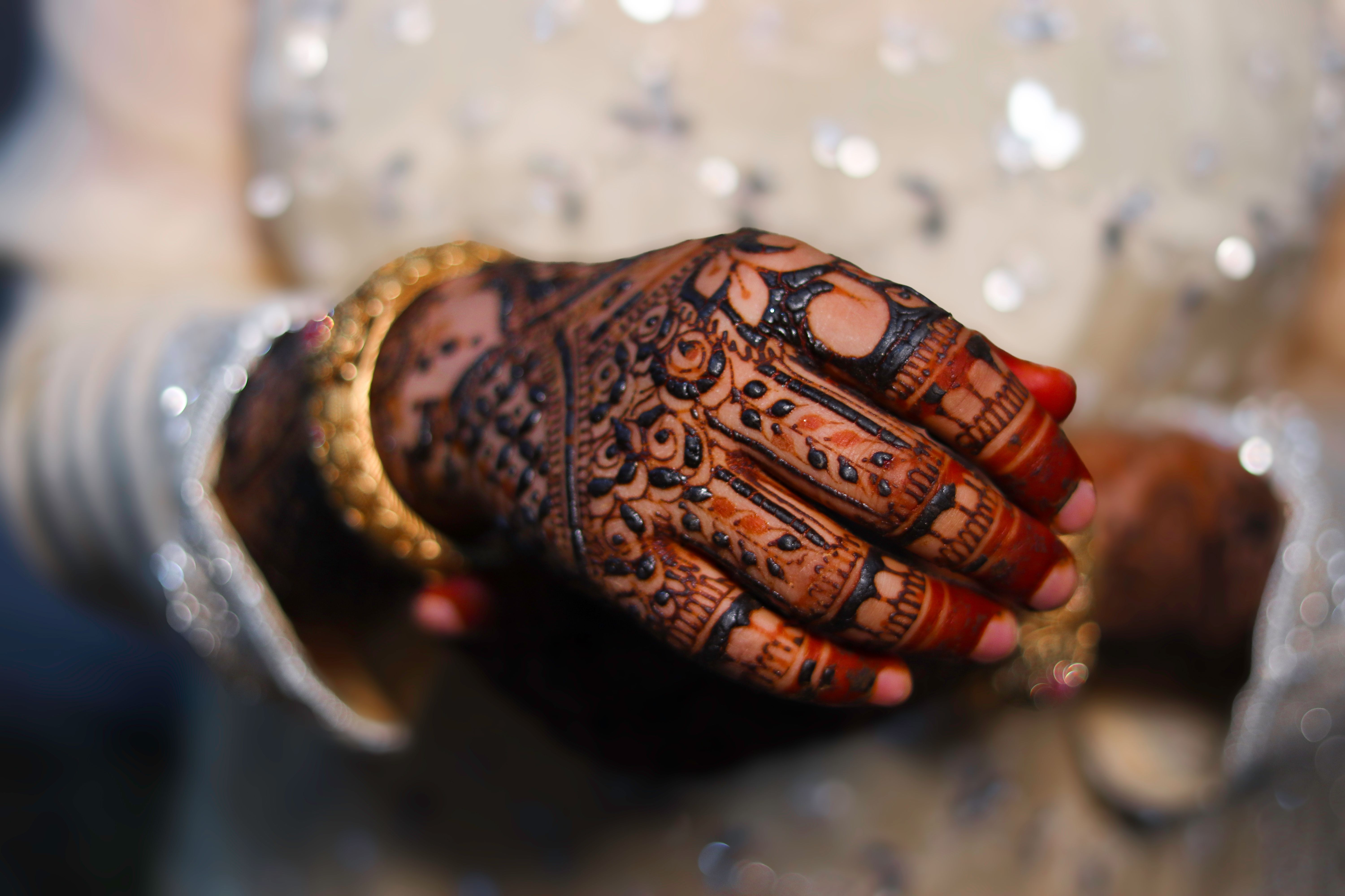 Intricate Mehndi Design on Bride's Hand · Free Stock Photo